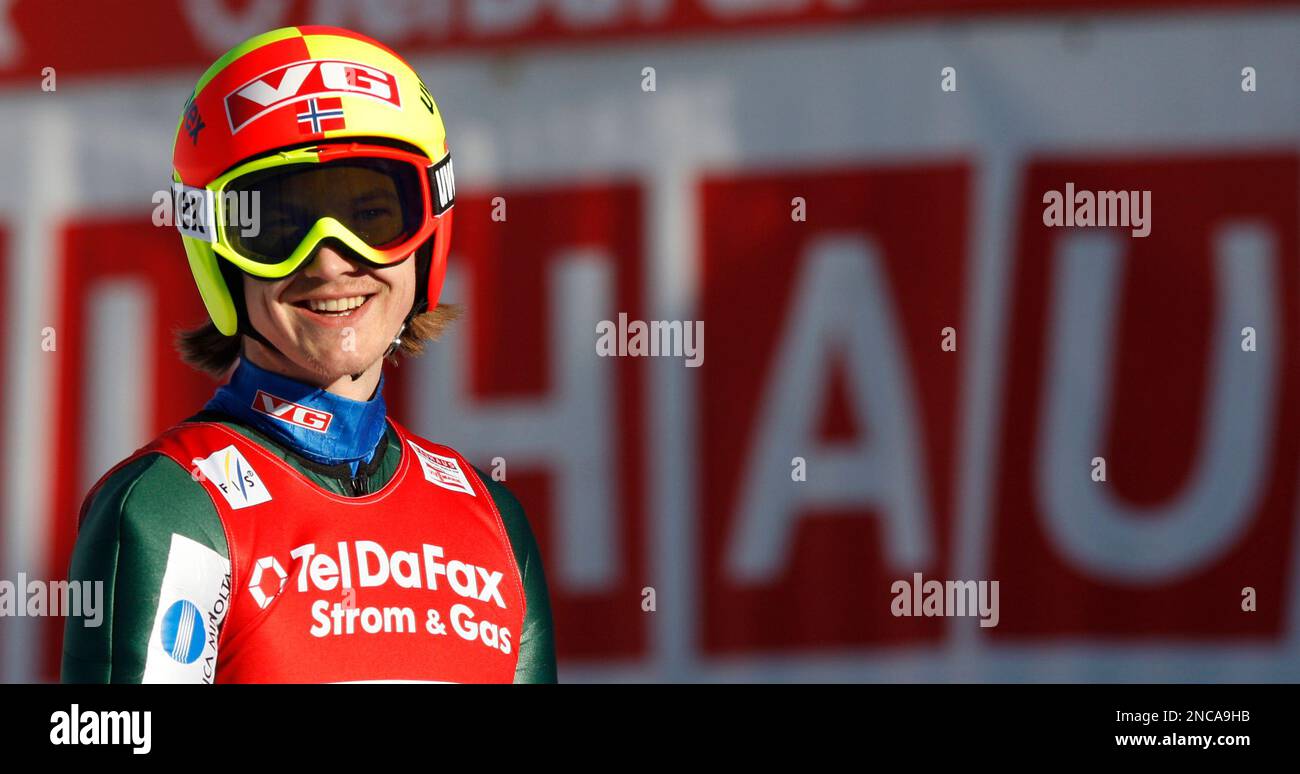 Norway's Tom Hilde looks on after his jump during the team competition ...