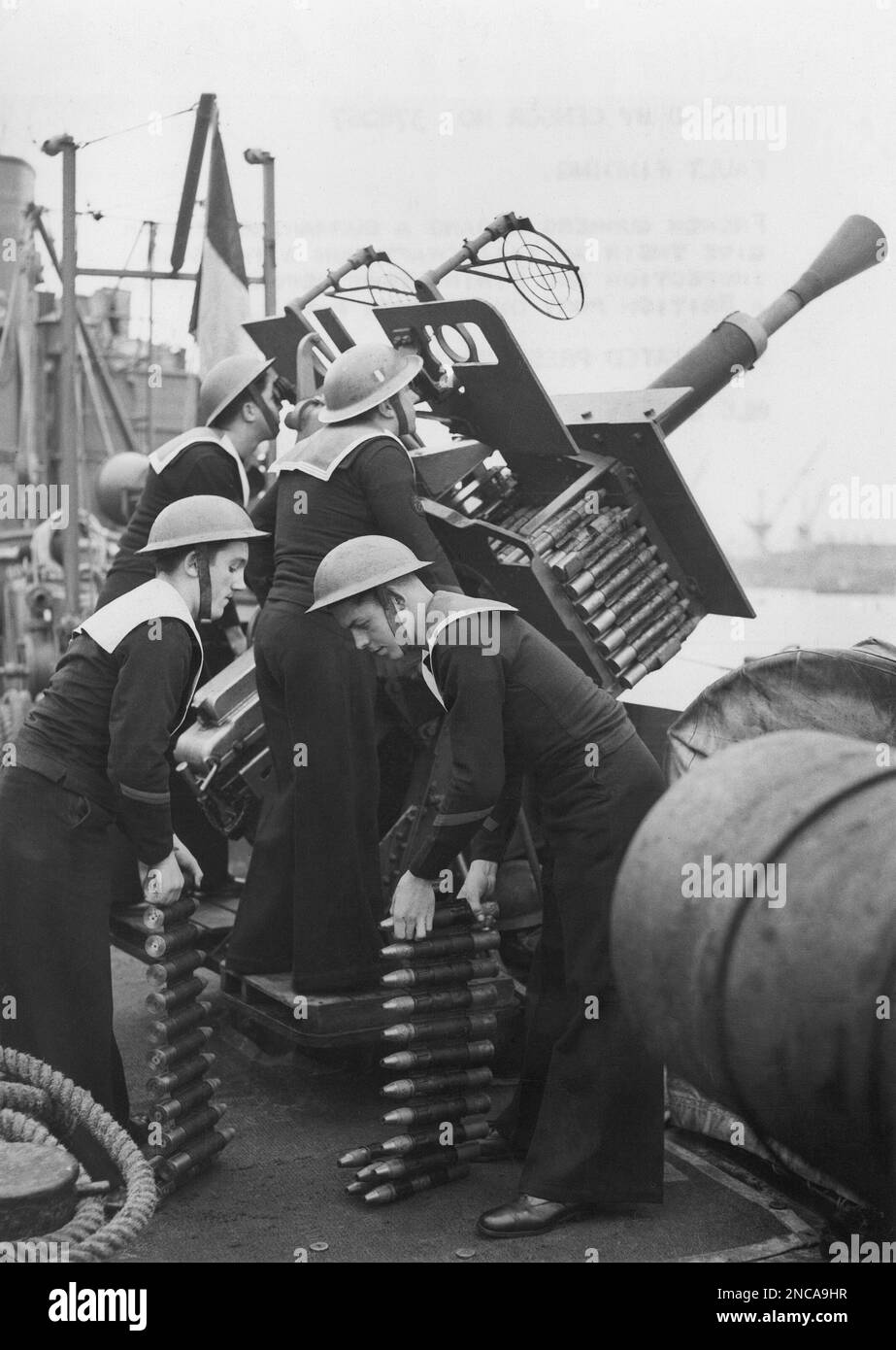 French gunners aboard a submarine chaser give their anti-aircraft gun a ...