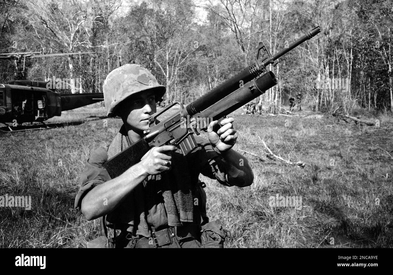 American paratrooper poses in South Vietnam’s war zone C on March 14 ...