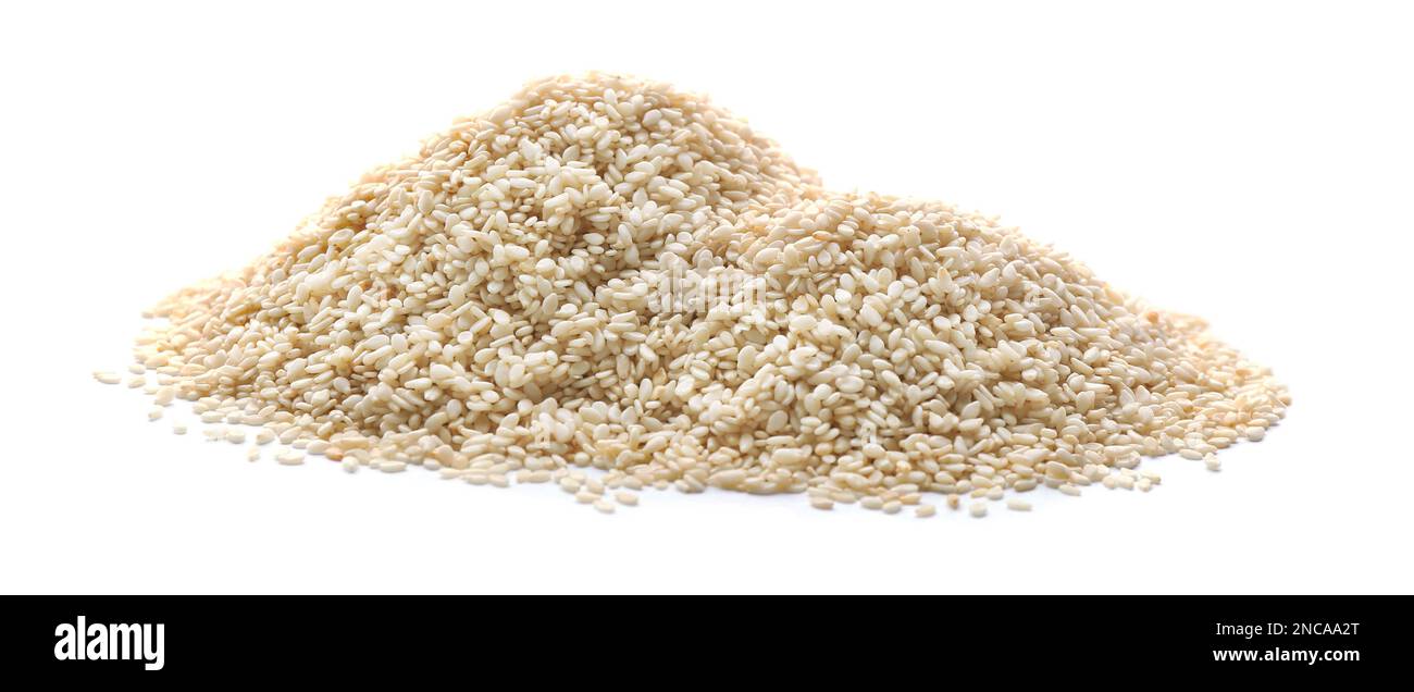 Pile of sesame seeds on white background Stock Photo - Alamy