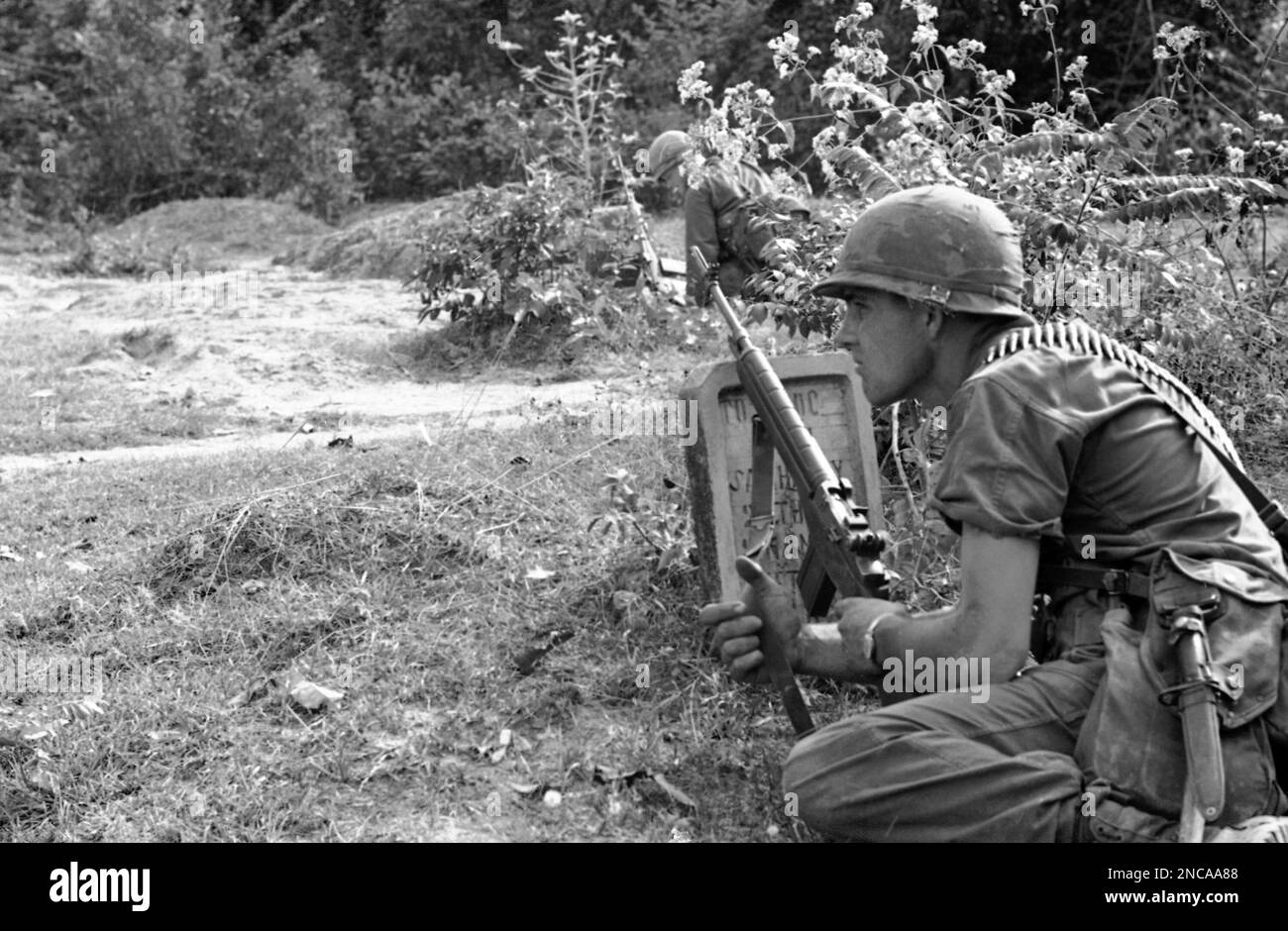 A member of the U.S. 1st battalion, 28th infantry (big red one) and a ...