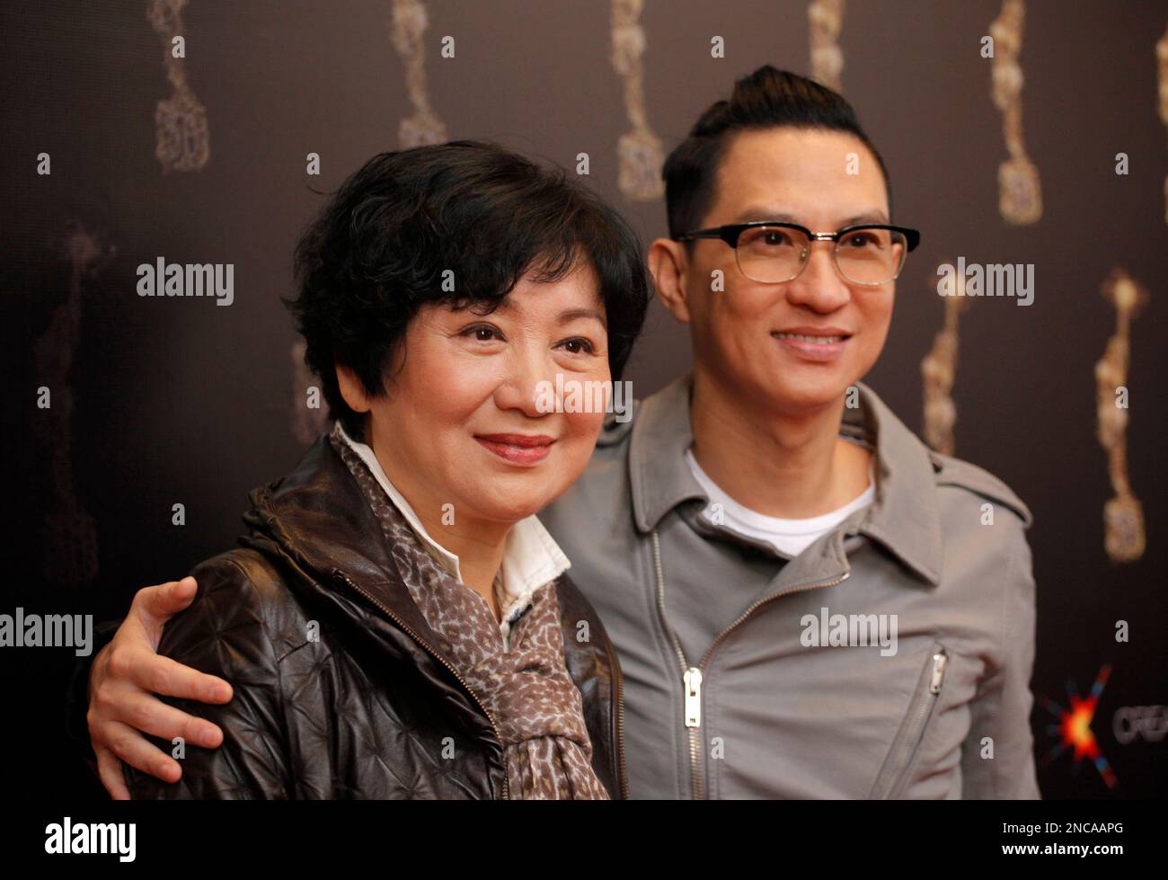 Hong Kong actress Paw Hee Ching and actor Nick Cheung pose for photographers at the announcement ...