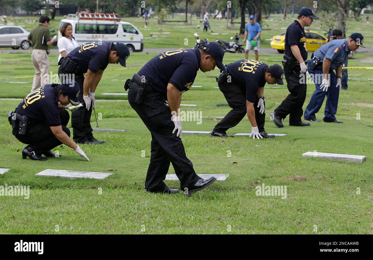 wldPolice investigators check an area where retired Gen. Angelo Reyes ...