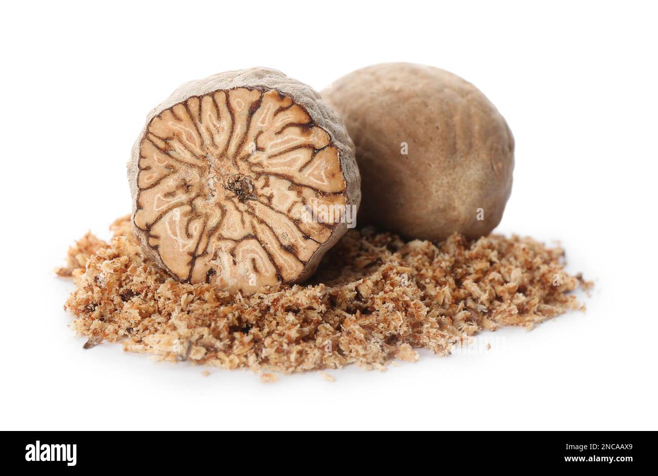 Grated nutmeg and seeds isolated on white Stock Photo - Alamy