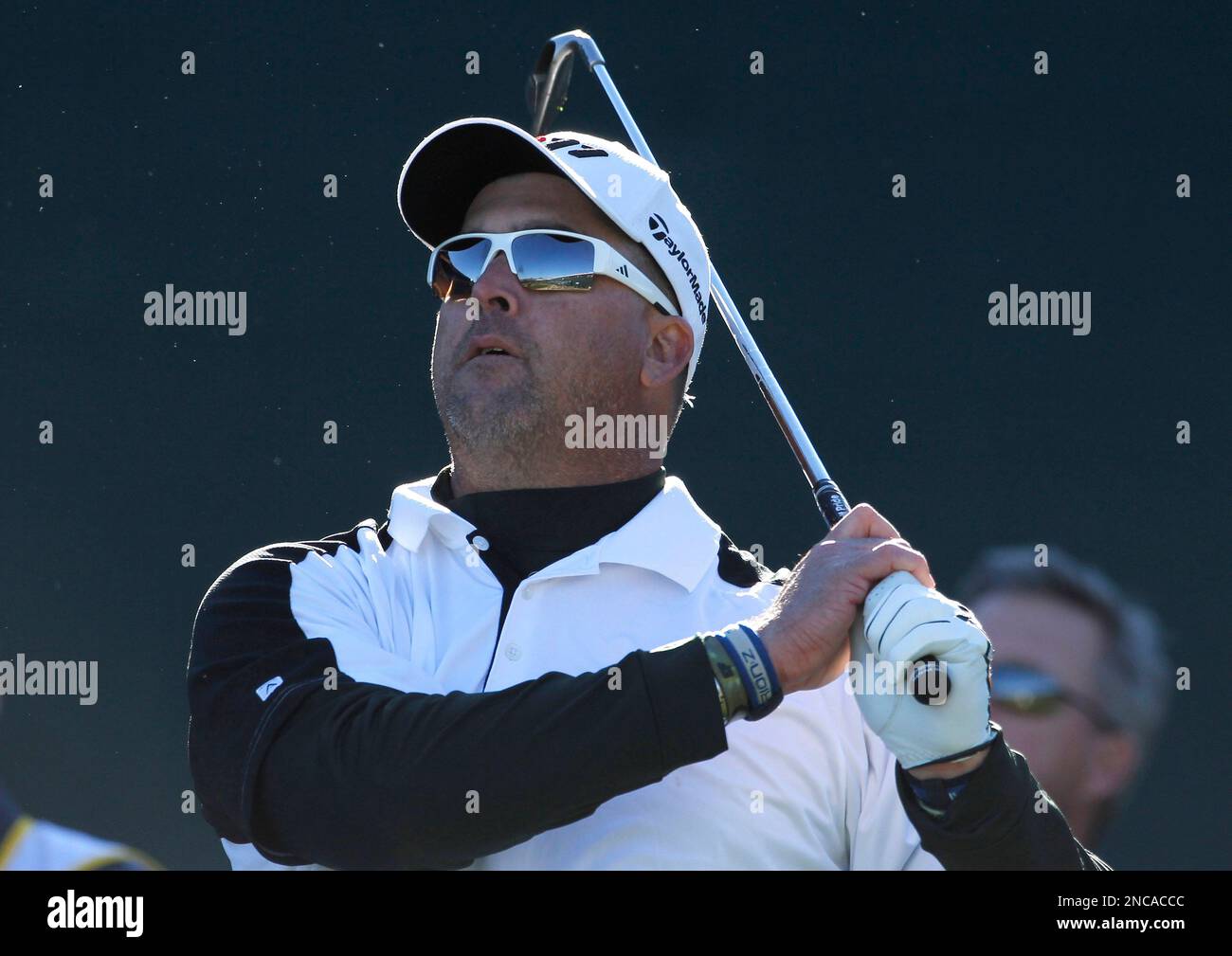Chris Couch tees off at the 16th hole during the first round of the ...