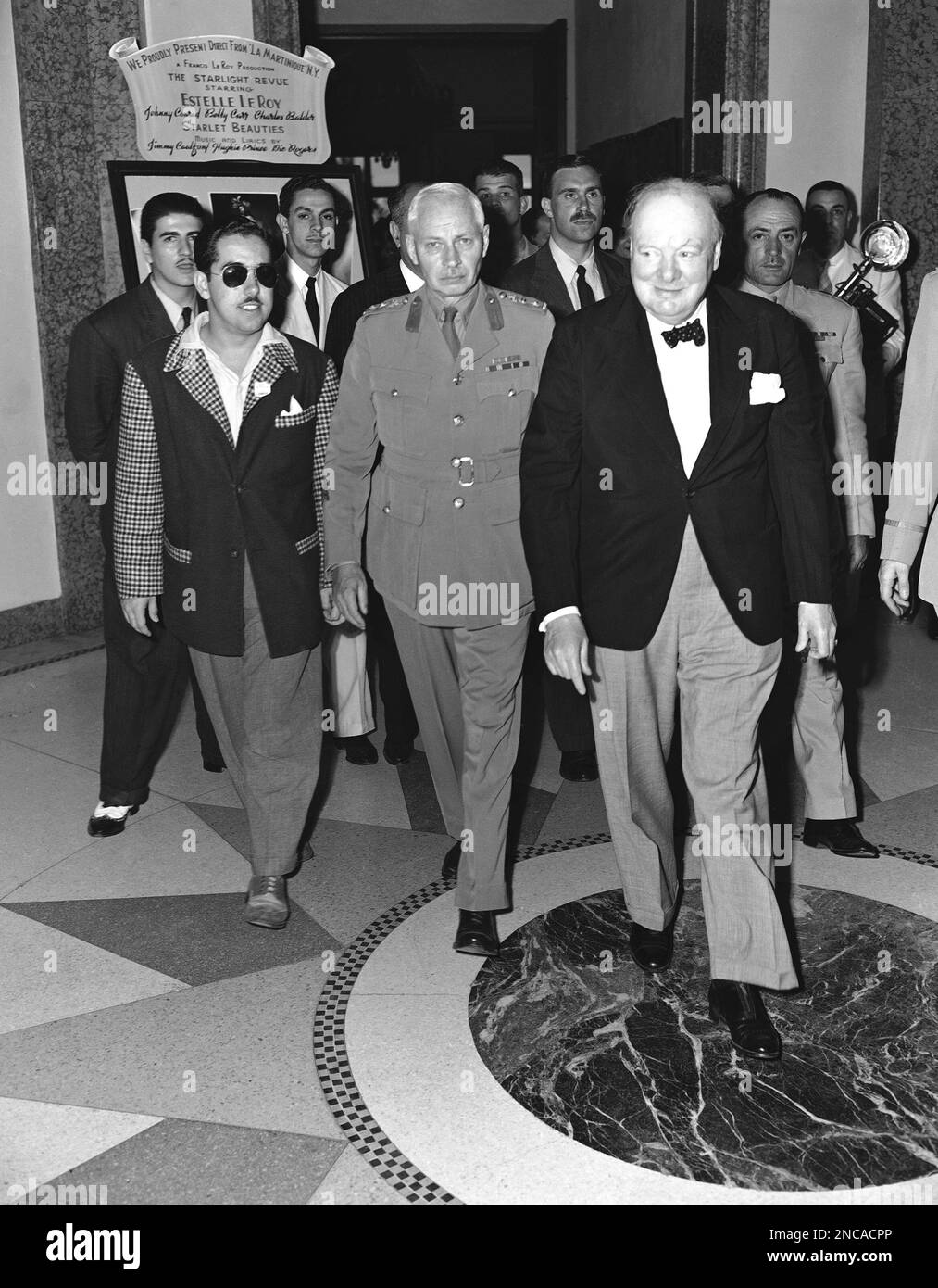 Winston Churchill with Col. Frank Clarke at his side leaves press ...
