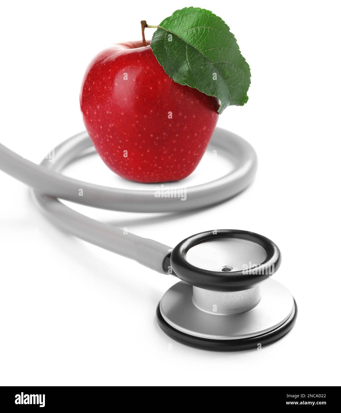 Stethoscope and red apple on white background Stock Photo - Alamy