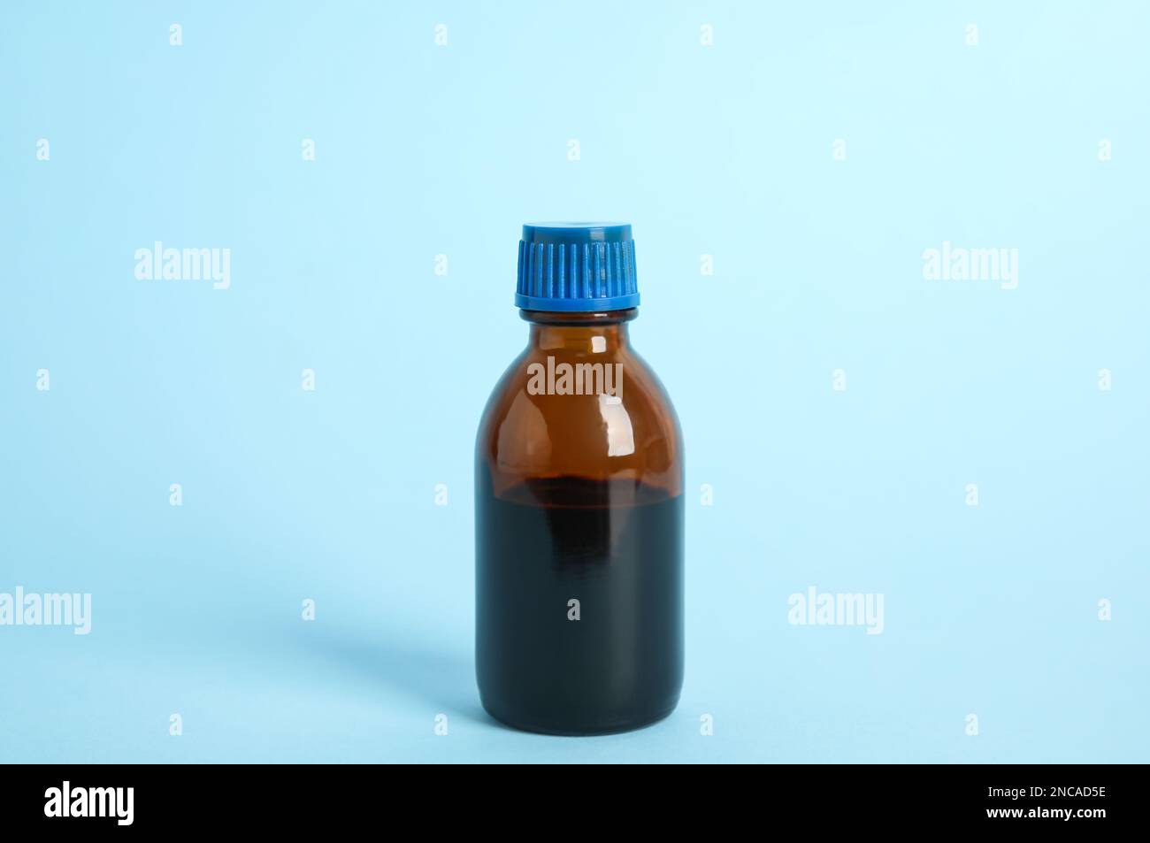 Bottle of medical iodine on light blue background Stock Photo - Alamy