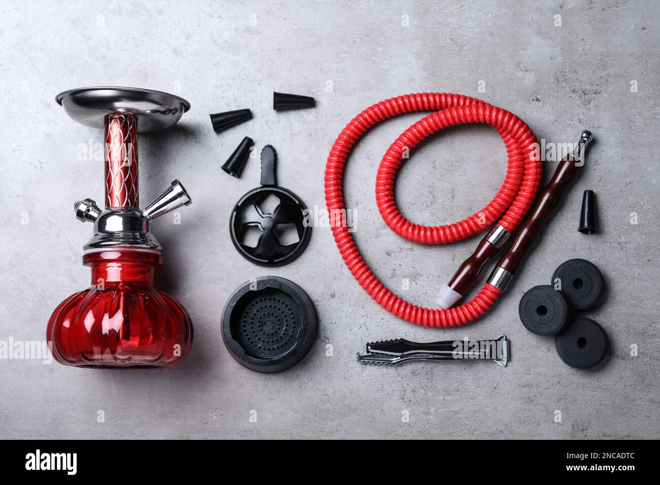 Flat lay composition with parts of hookah on grey table Stock Photo - Alamy