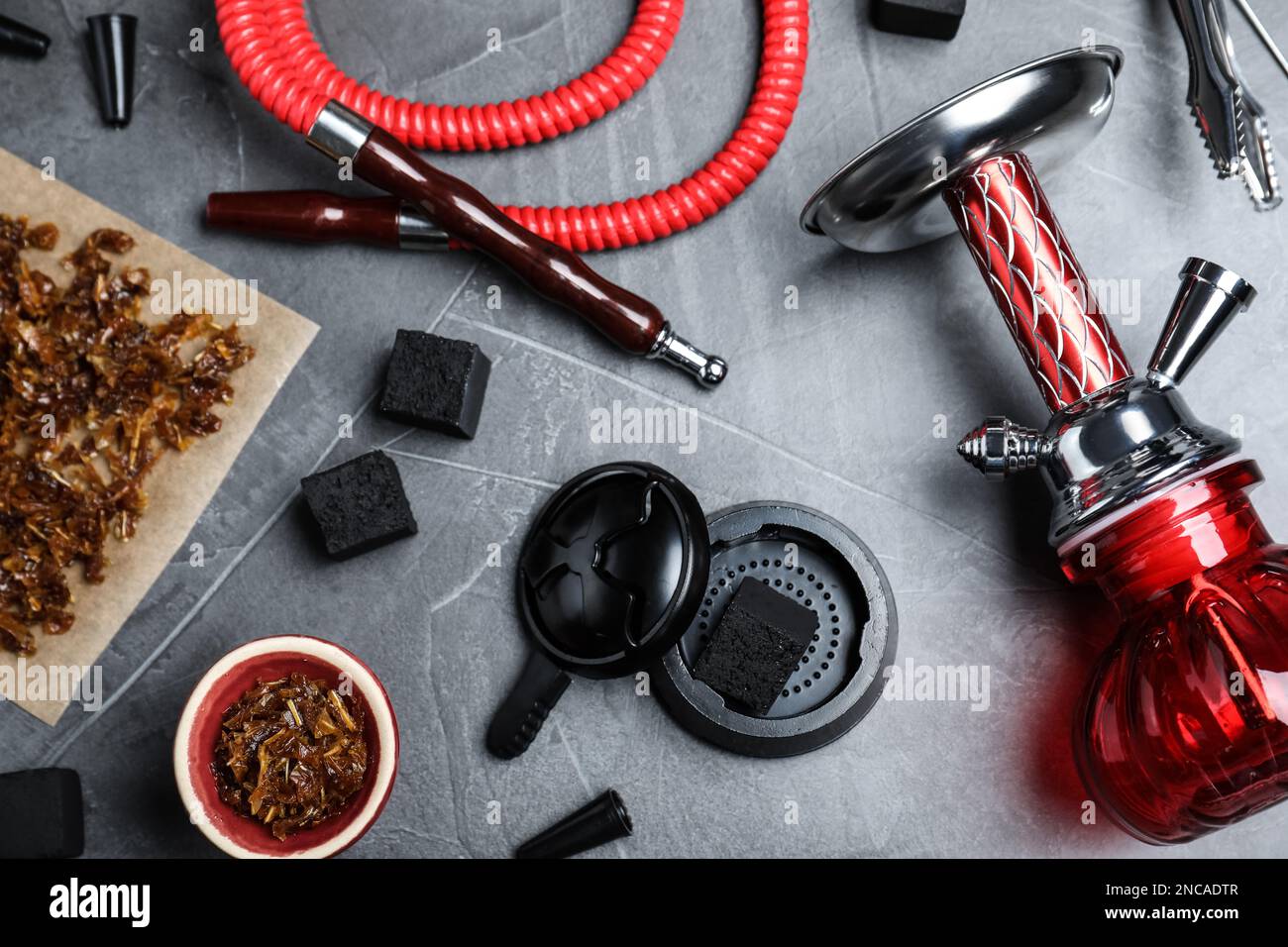 Flat lay composition with parts of hookah on grey table Stock Photo - Alamy