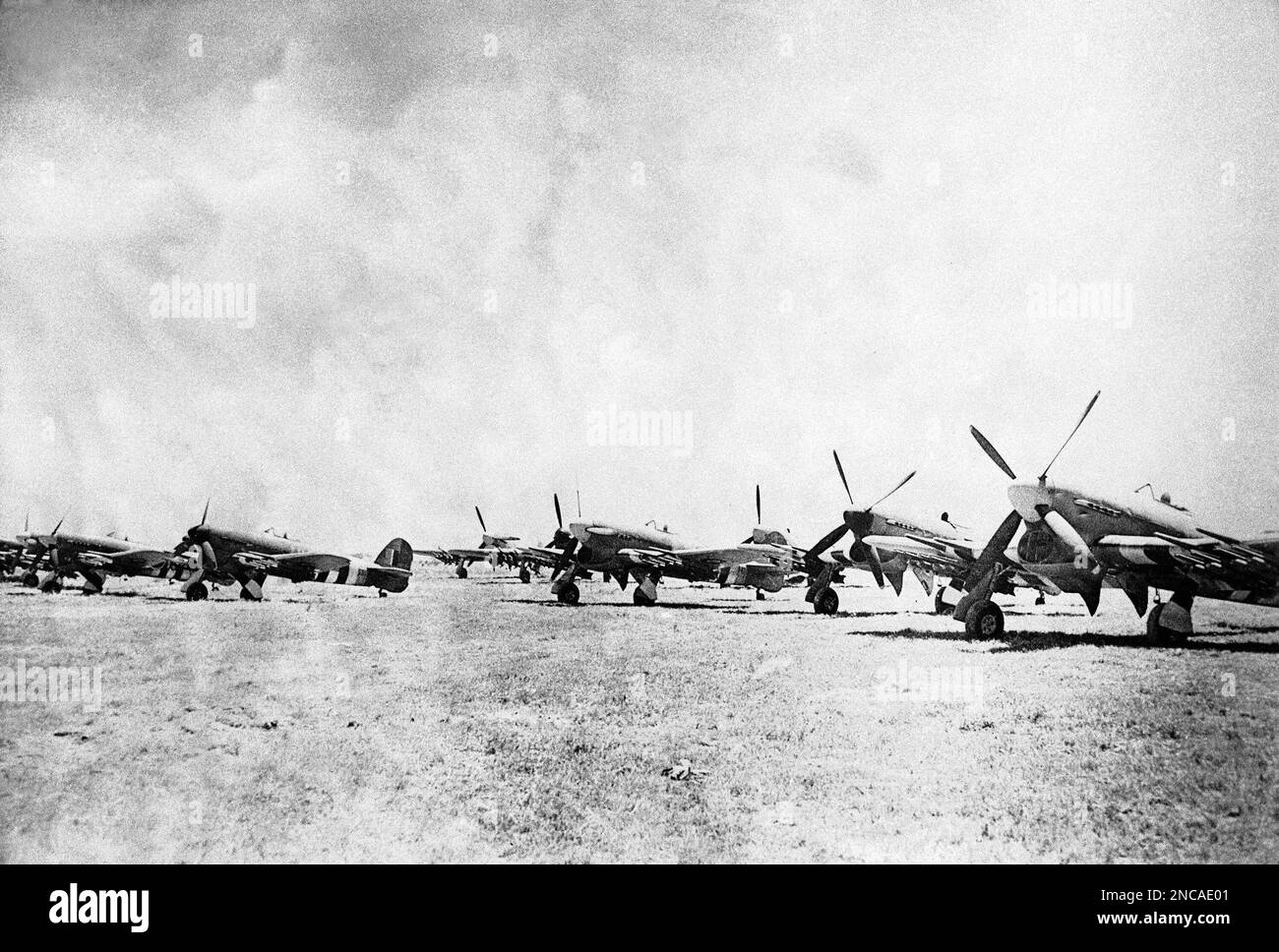 RAF Typhoon planes, carrying rocket projectiles, line up at a newly ...
