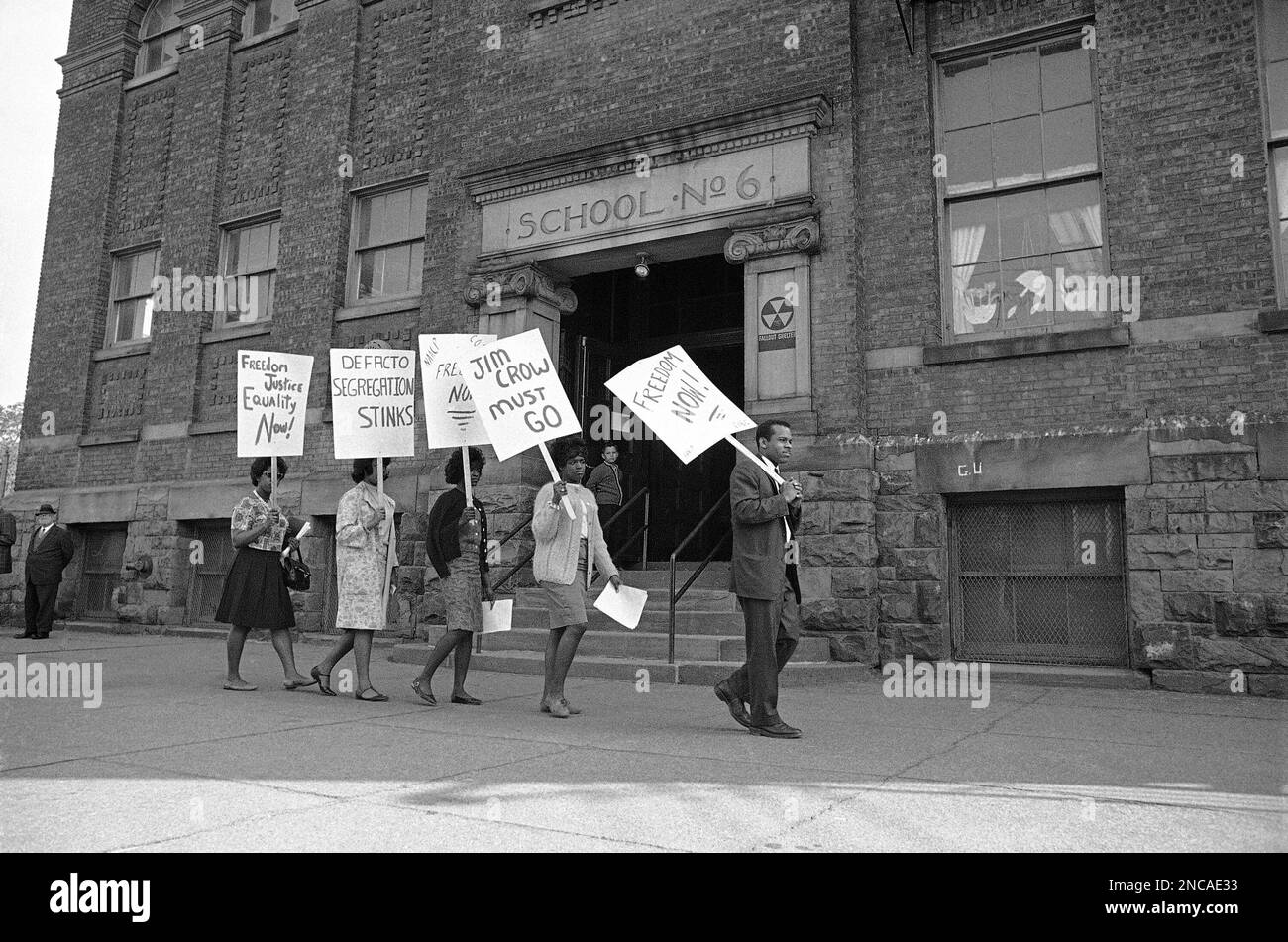 A handful of pickets parade at Albany's School 6, May 18, 1964 to ...