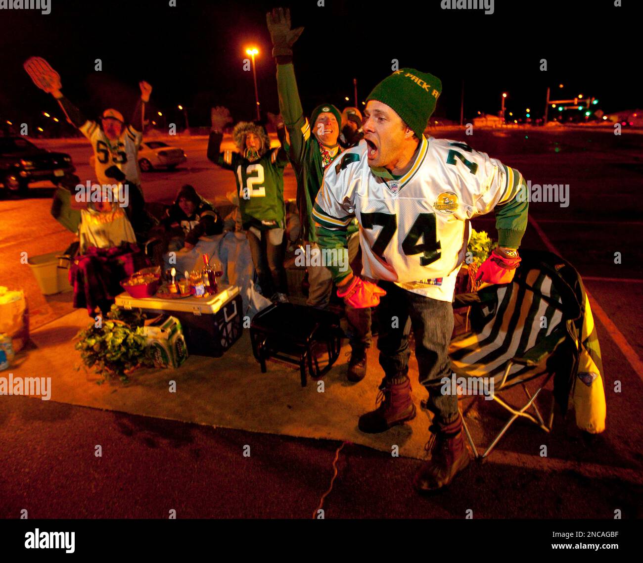 Green Bay Packers fan Troy Knaus cheers the Packers' first touchdown ...
