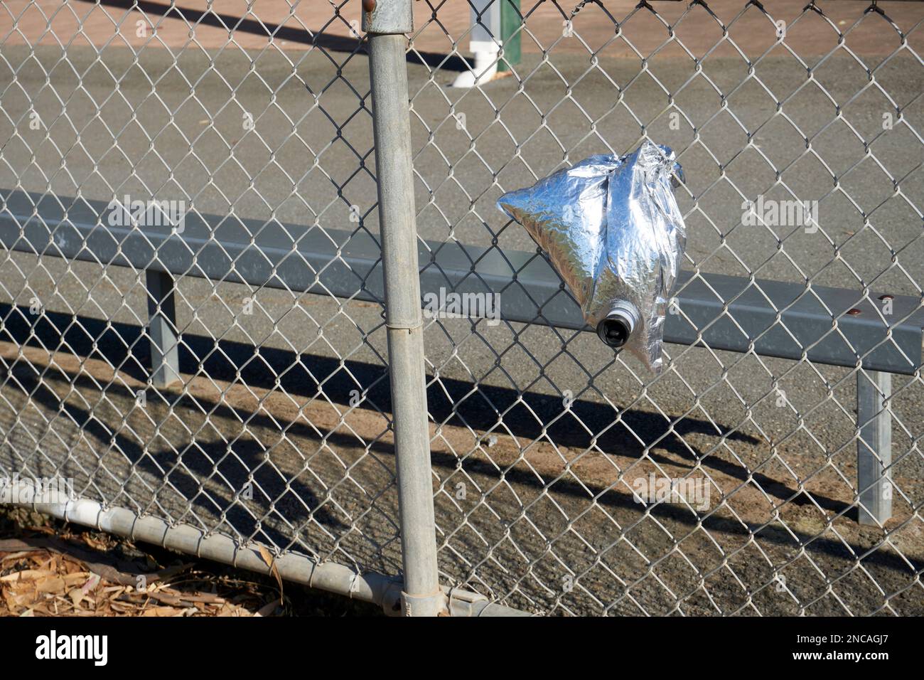 Plastic bag stuck on fence hi-res stock photography and images - Alamy