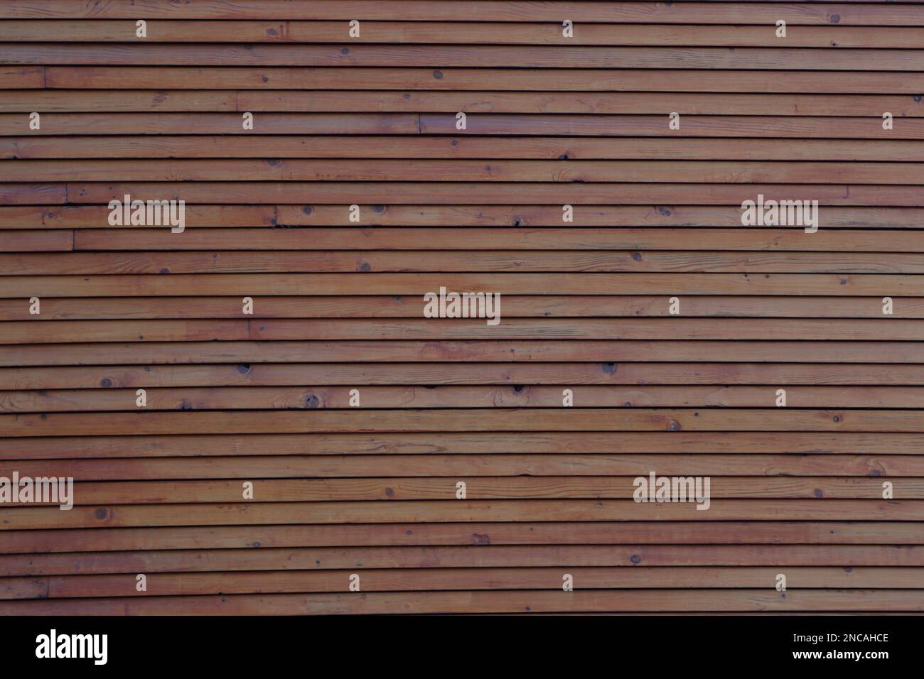 horizontal stripes of yellow and brown wood, wooden wall background ...