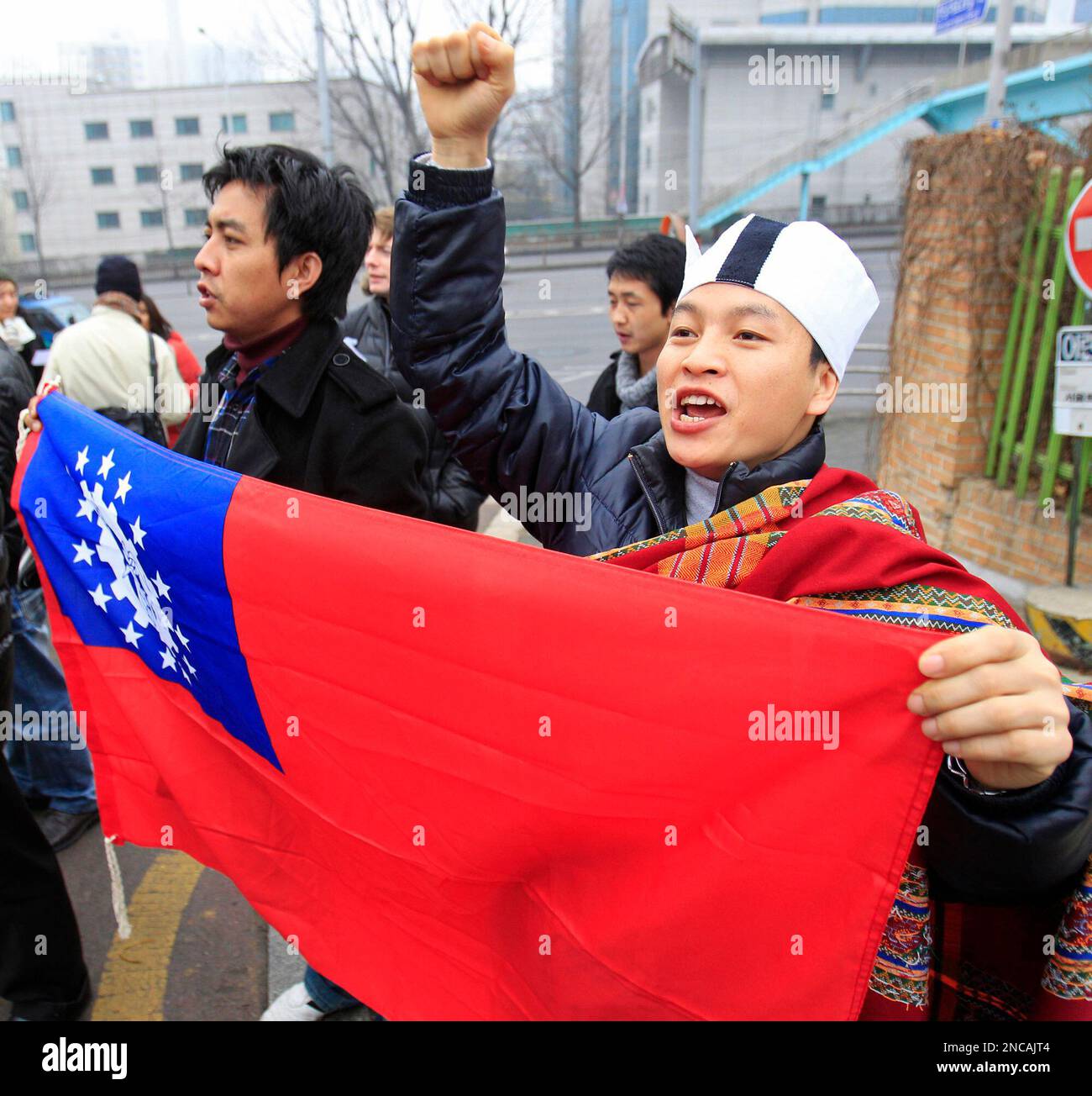 Members of ethnic people of Myanmar, hold their old national flag ...