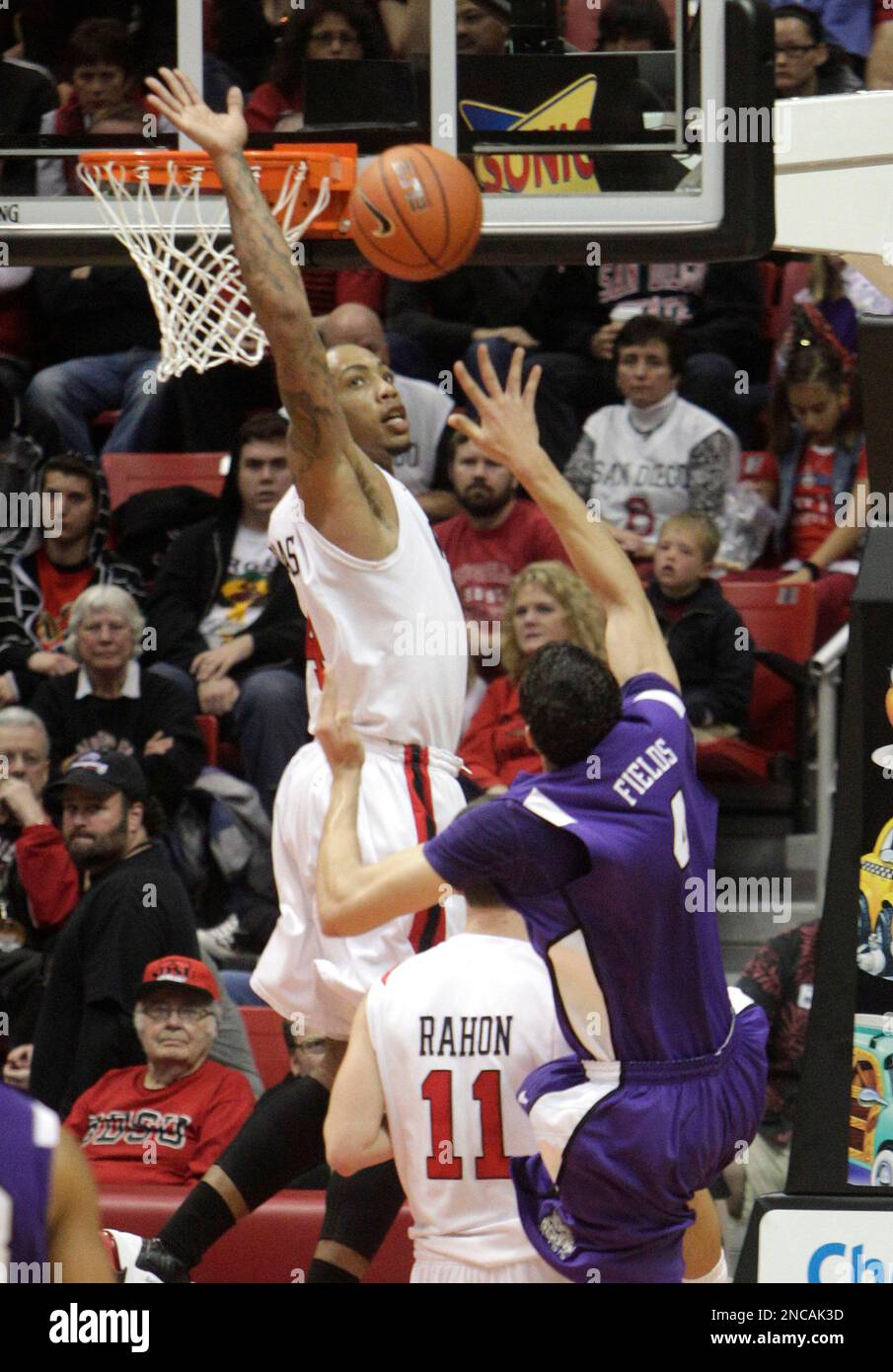 San Diego State's Malcolm Thomas gblocks the shot of TCU's Amric Fields ...