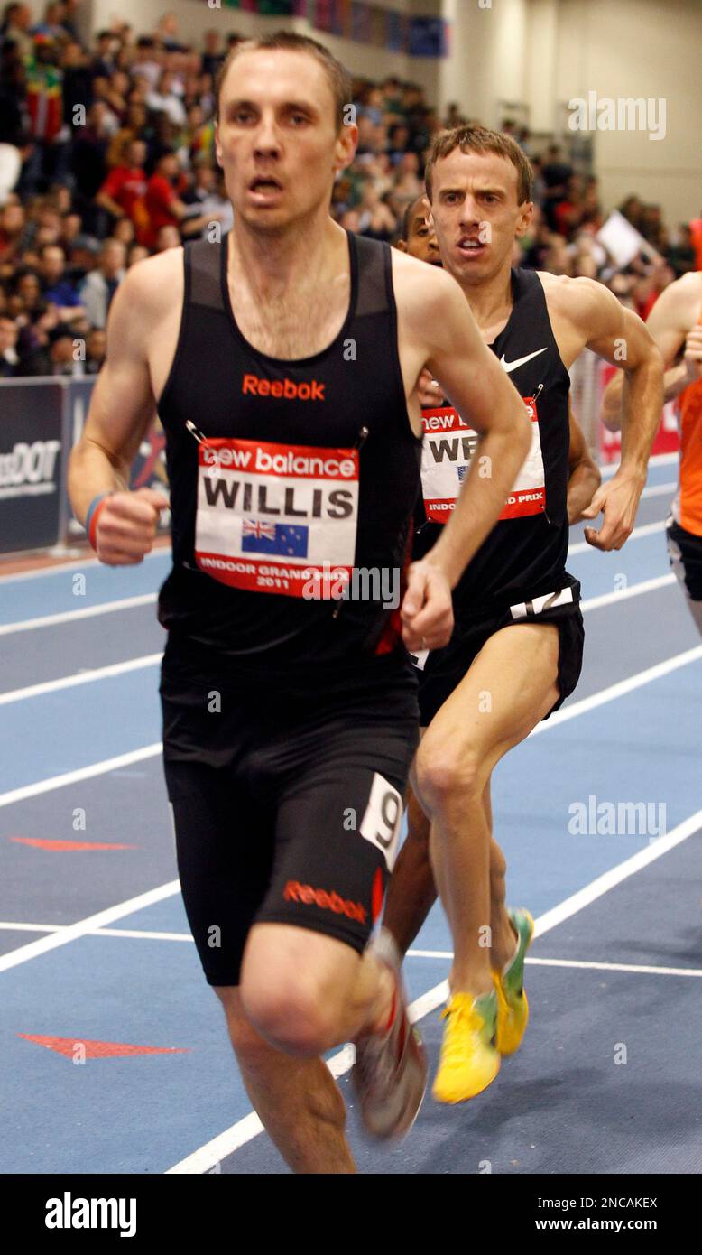 Alan Webb, behind, eyes Nick Willis, front, of New Zealand, as they ...