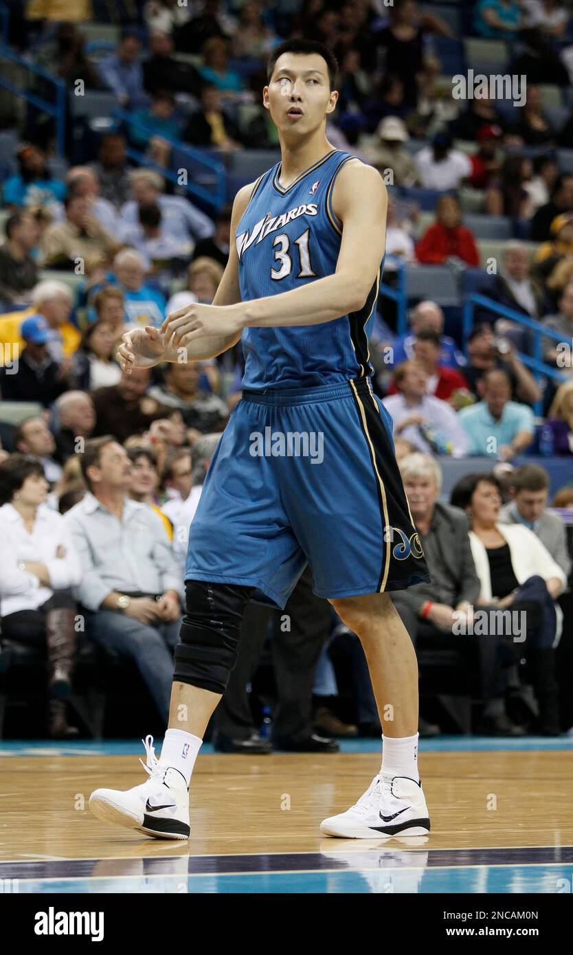 Washington Wizards forward Yi Jianlian, of China, walks on the court in ...