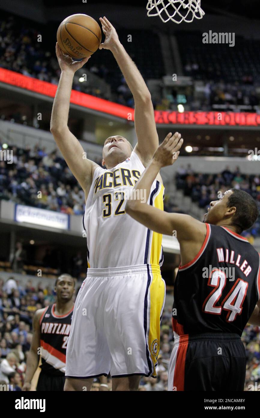 Indiana Pacers forward Josh McRoberts, left, shoots over Portland Trail ...