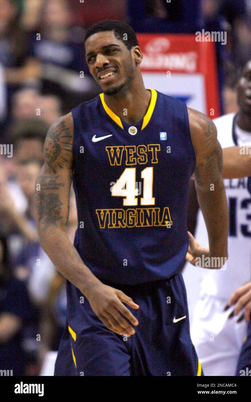 West Virginia's John Flowers (41) reacts after he missed a shot against ...