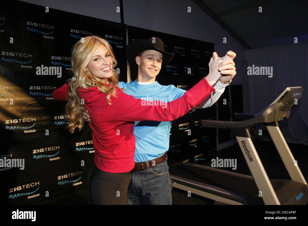 Sports reporter Erin Andrews, left, and Rodeo Champion Ty Murray, right ...
