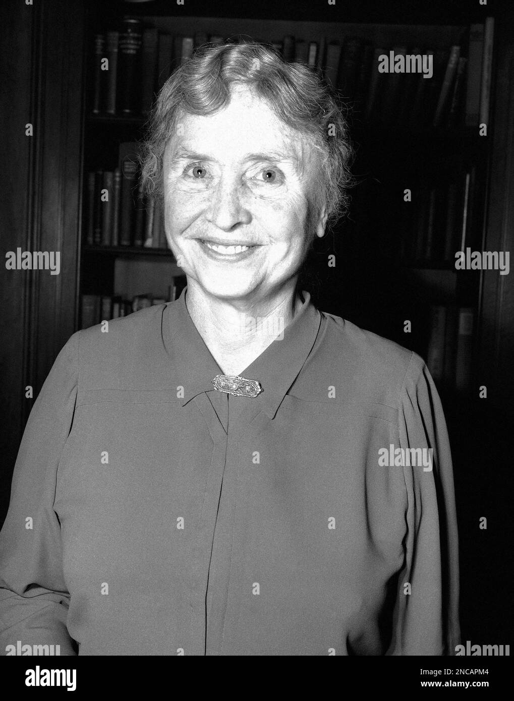 Helen Keller, deaf and blind student, lecturer and fund-raiser, poses ...