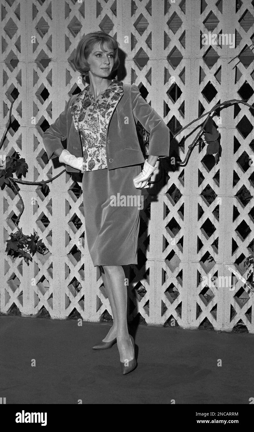 Rosalie Calvert models the luxurious of fabric and simple in styling ...