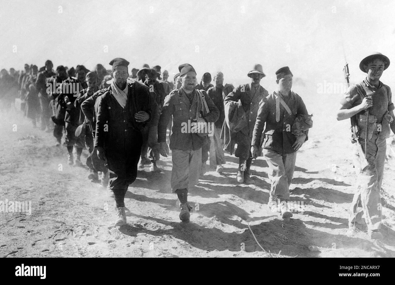 Masses of Italian prisoners being marched back, in some cases with only ...
