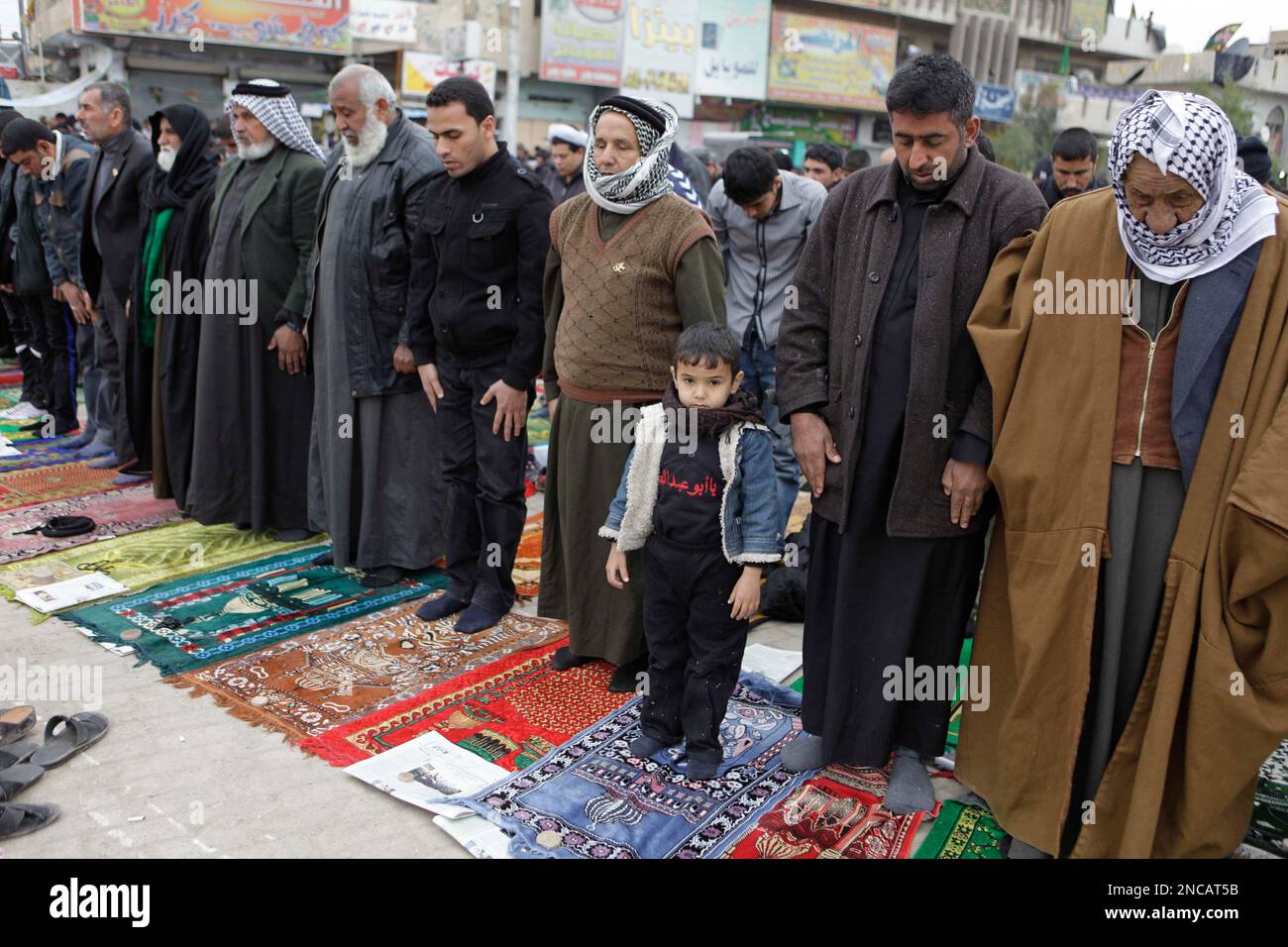 Followers of radical Shiite cleric Muqtada al-Sadr attend Friday ...