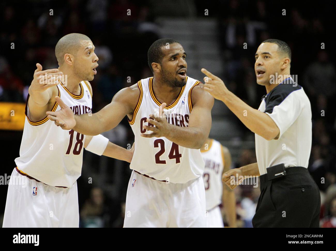 Cleveland Cavaliers' Anthony Parker (18) and Samardo Samuels (24) argue ...