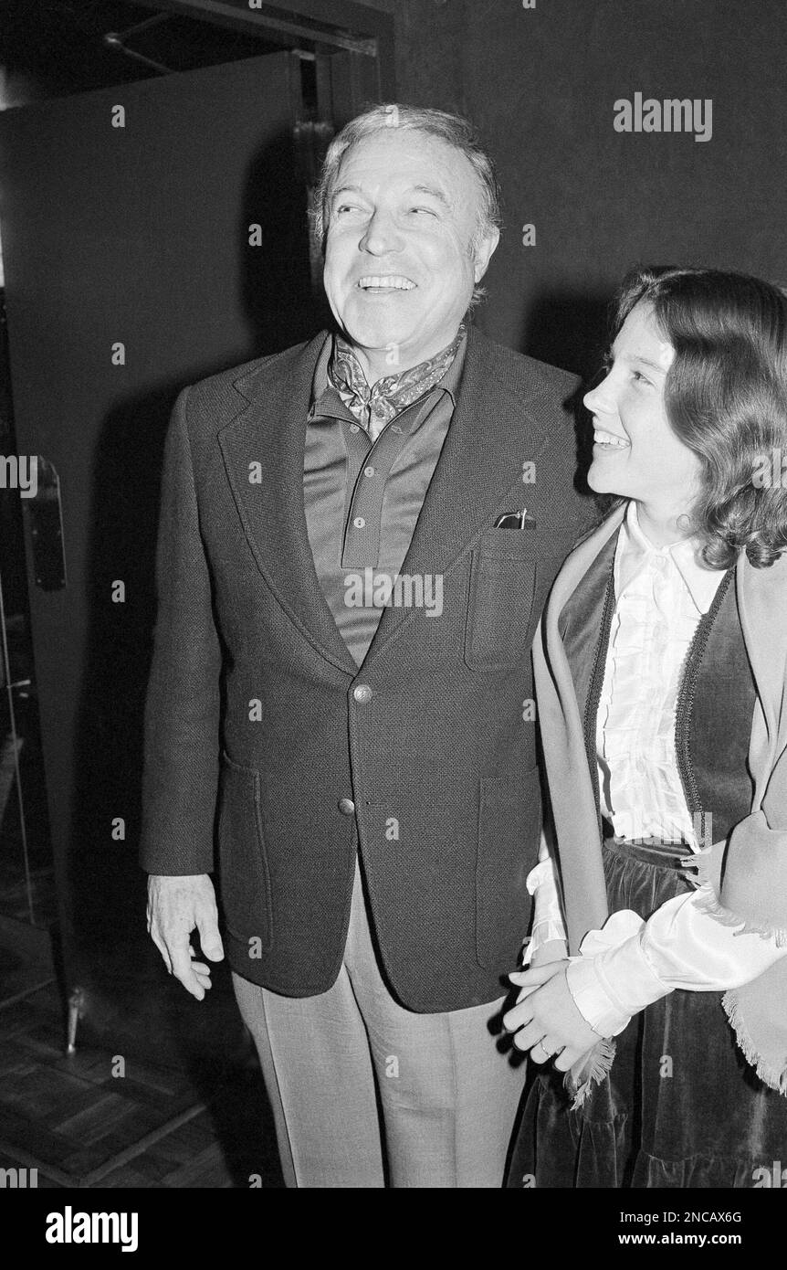 Dancer Gene Kelly and his daughter Bridget, 13, at an opening party for ...