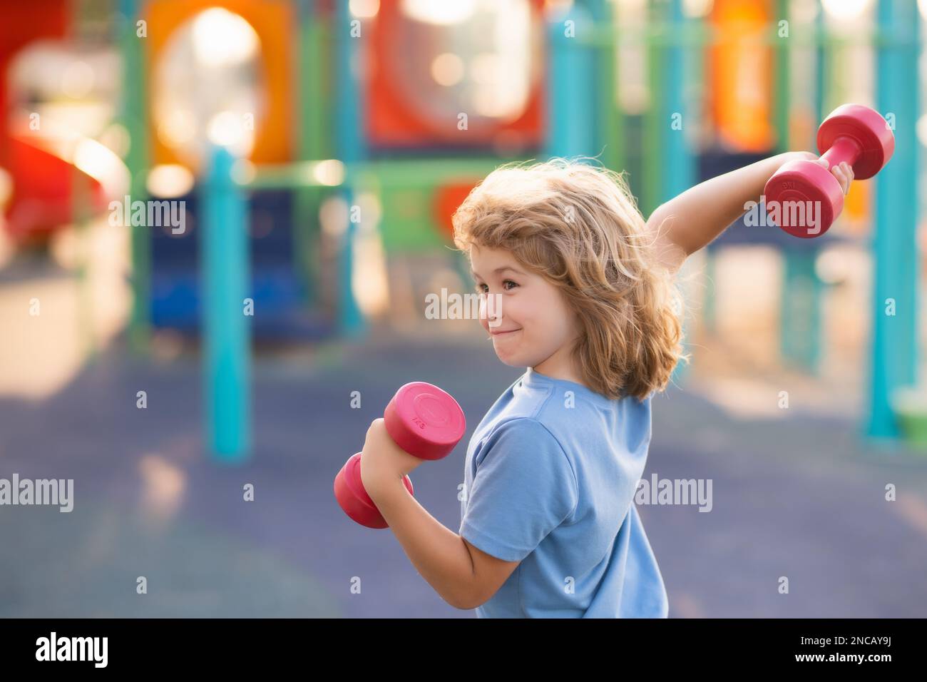 Kids sport training on playground outdoor. Healthy kids. Sport activities at leisure with ...