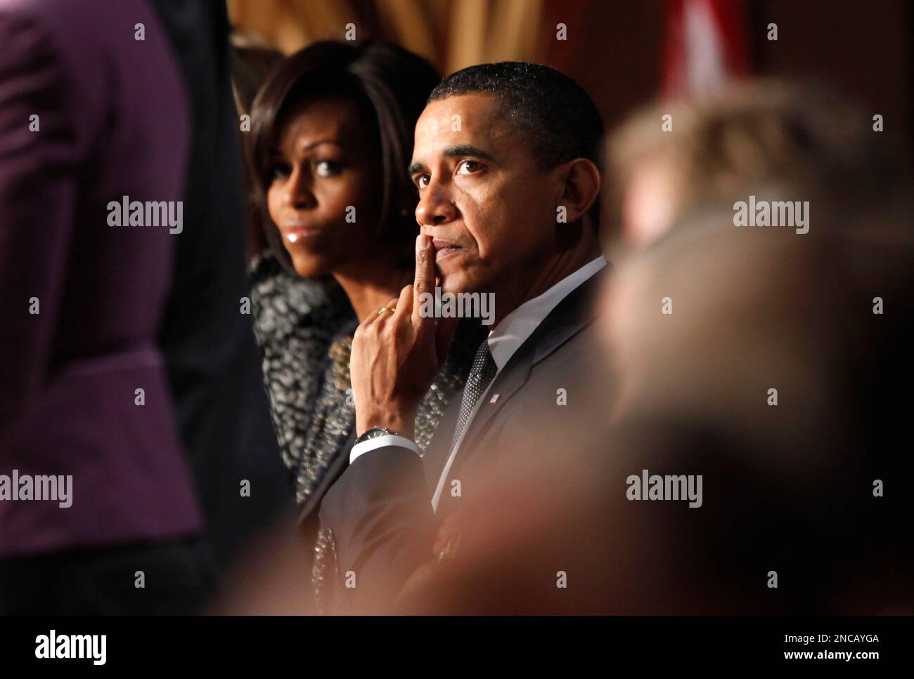 President Barack Obama and first lady Michelle Obama attend the ...