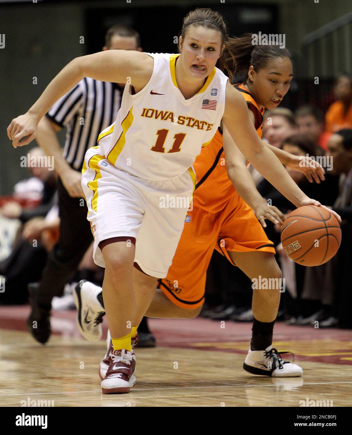 Iowa State guard Kelsey Bolte, left, drives upcourt past Oklahoma State ...