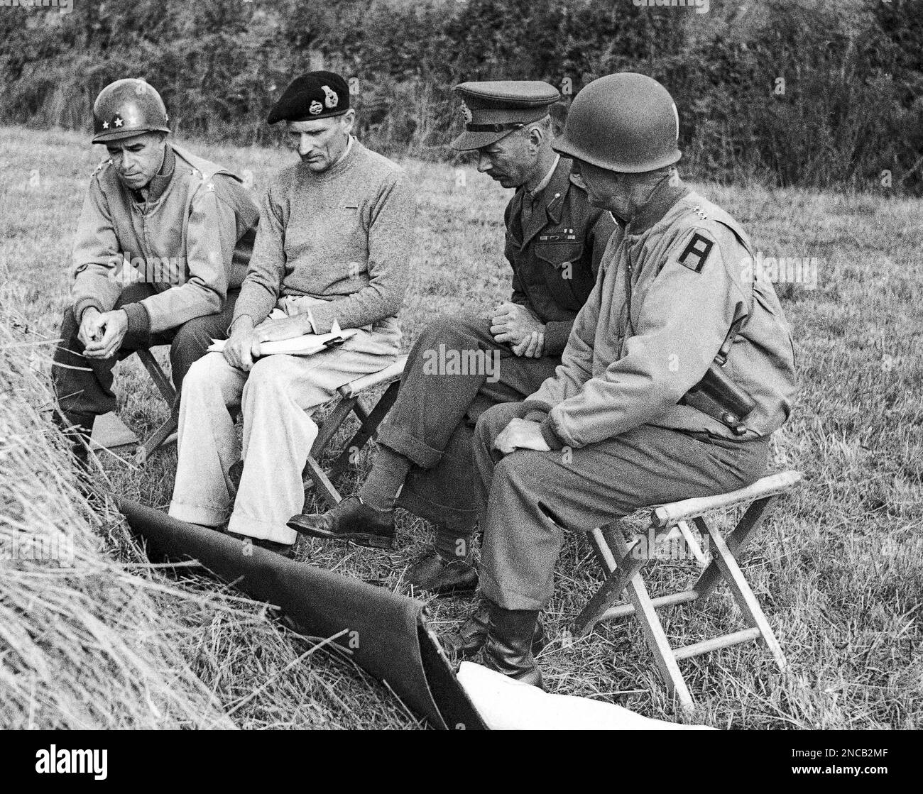 American and British Army commanders held a conference in a hayfield ...