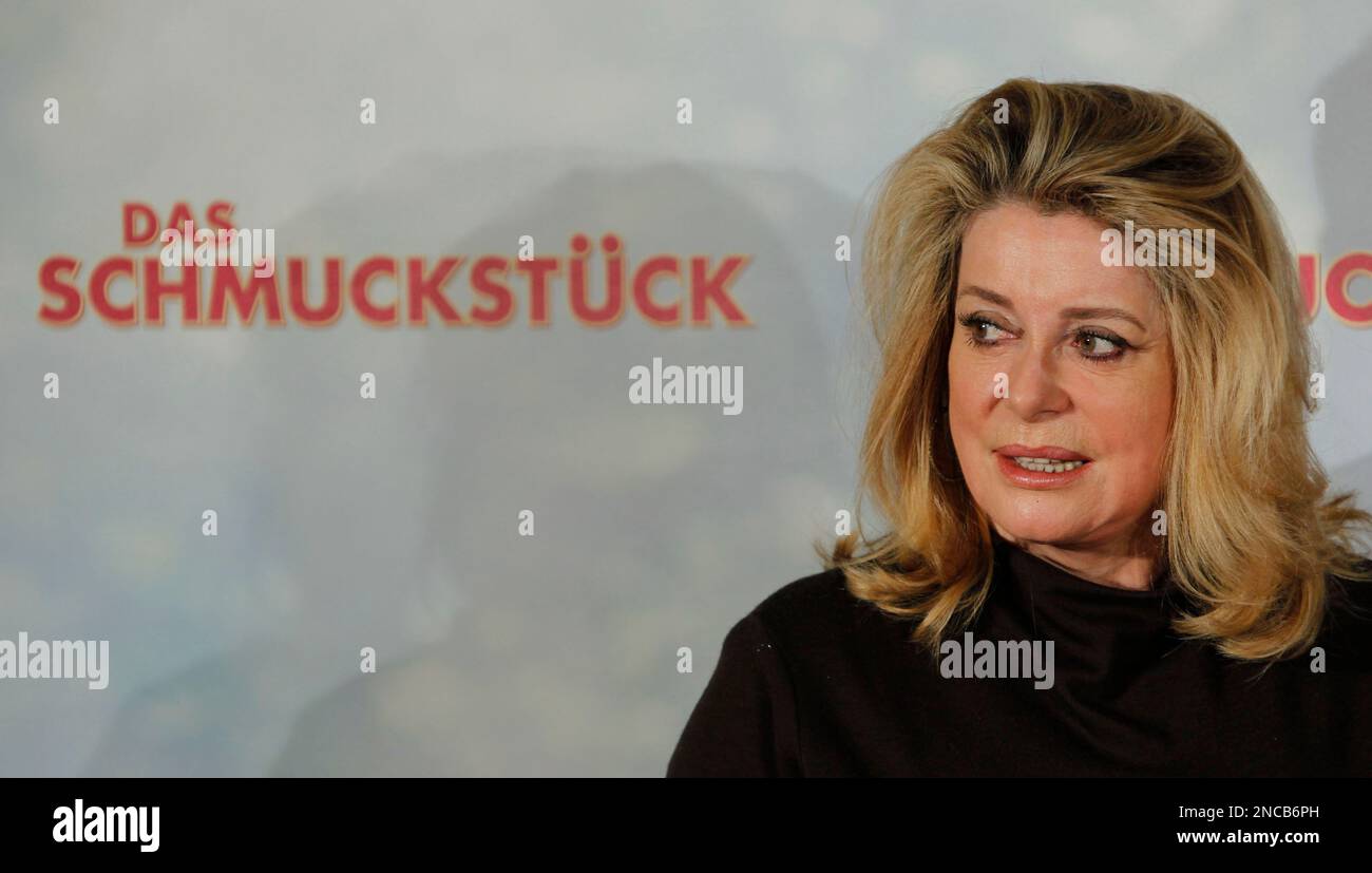 French actress Catherine Deneuve poses for her new movie "Potiche ...
