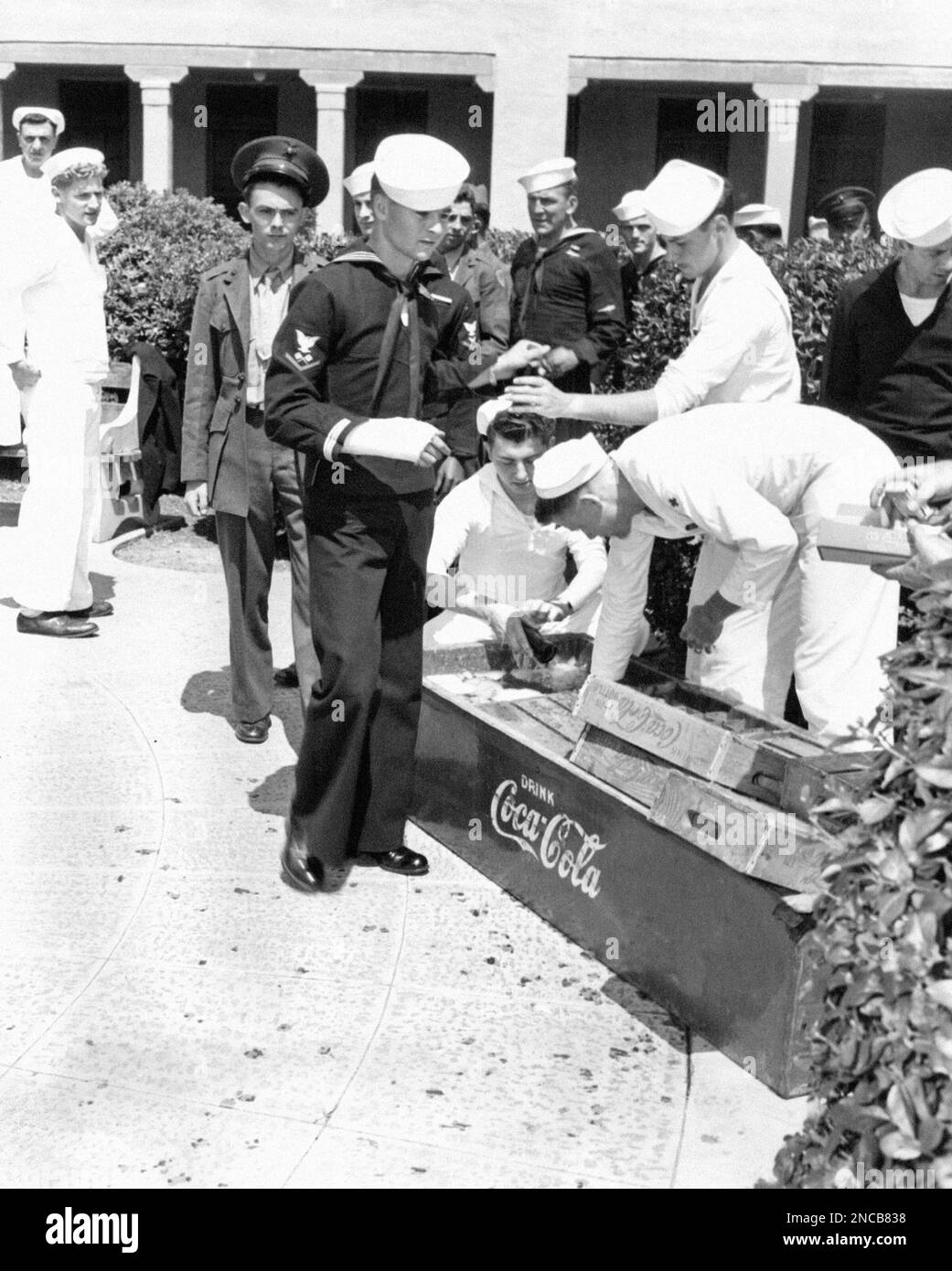 Refreshments and cigarettes are distributed to patients arriving at the ...