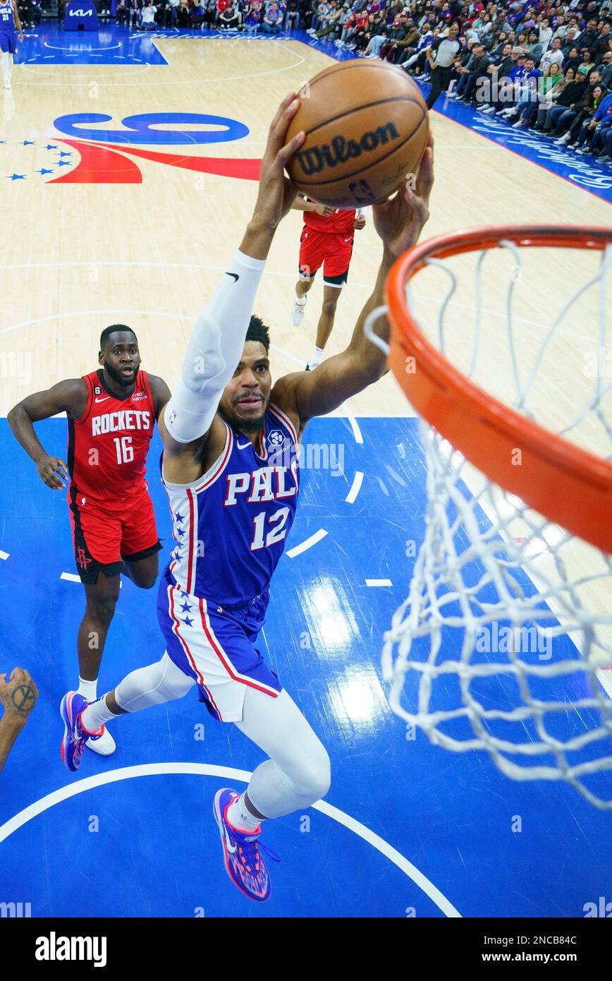 Philadelphia 76ers' Tobias Harris, right, goes up for the shot as ...