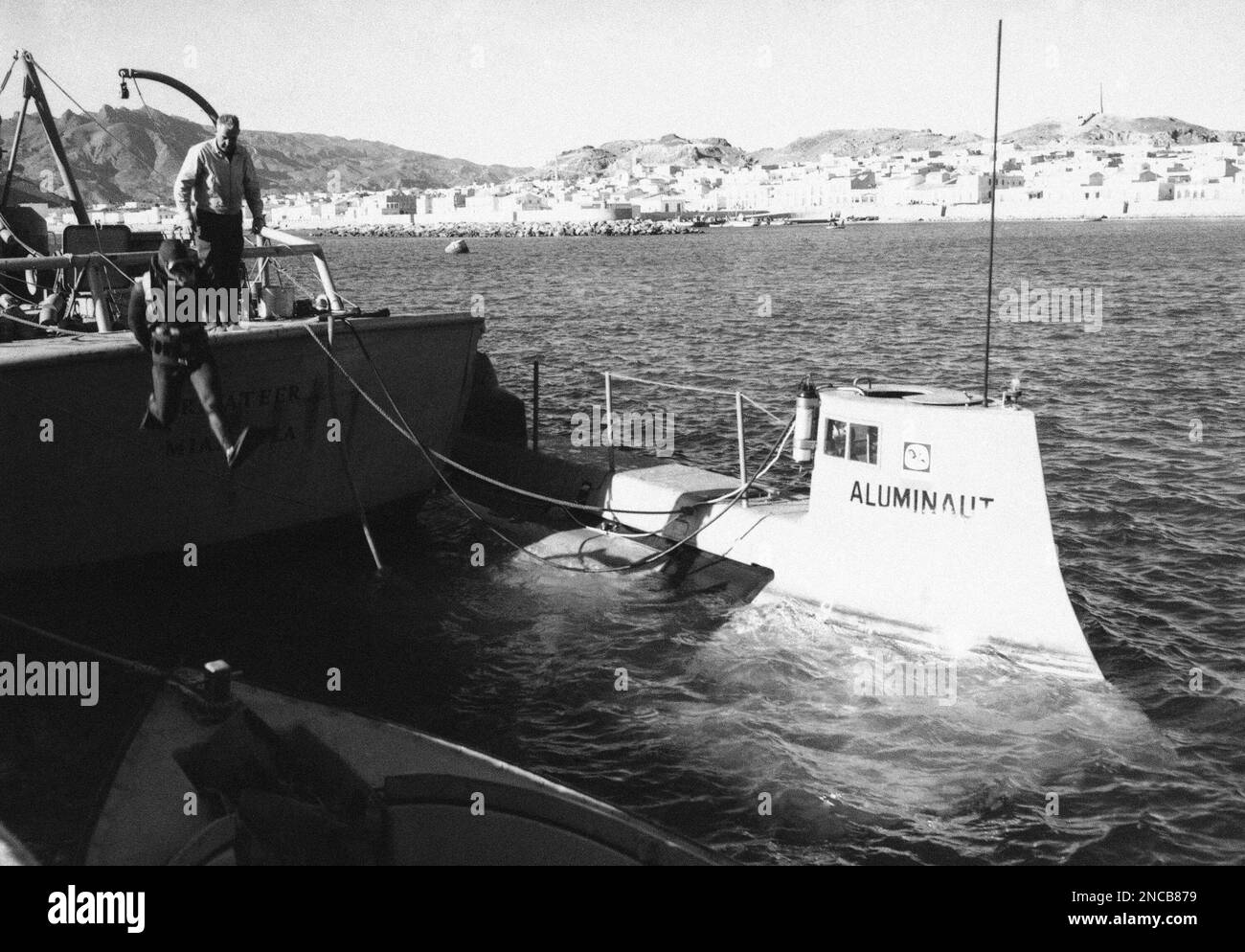 The Reynolds research submarine, Aluminaut, is seen getting an ...