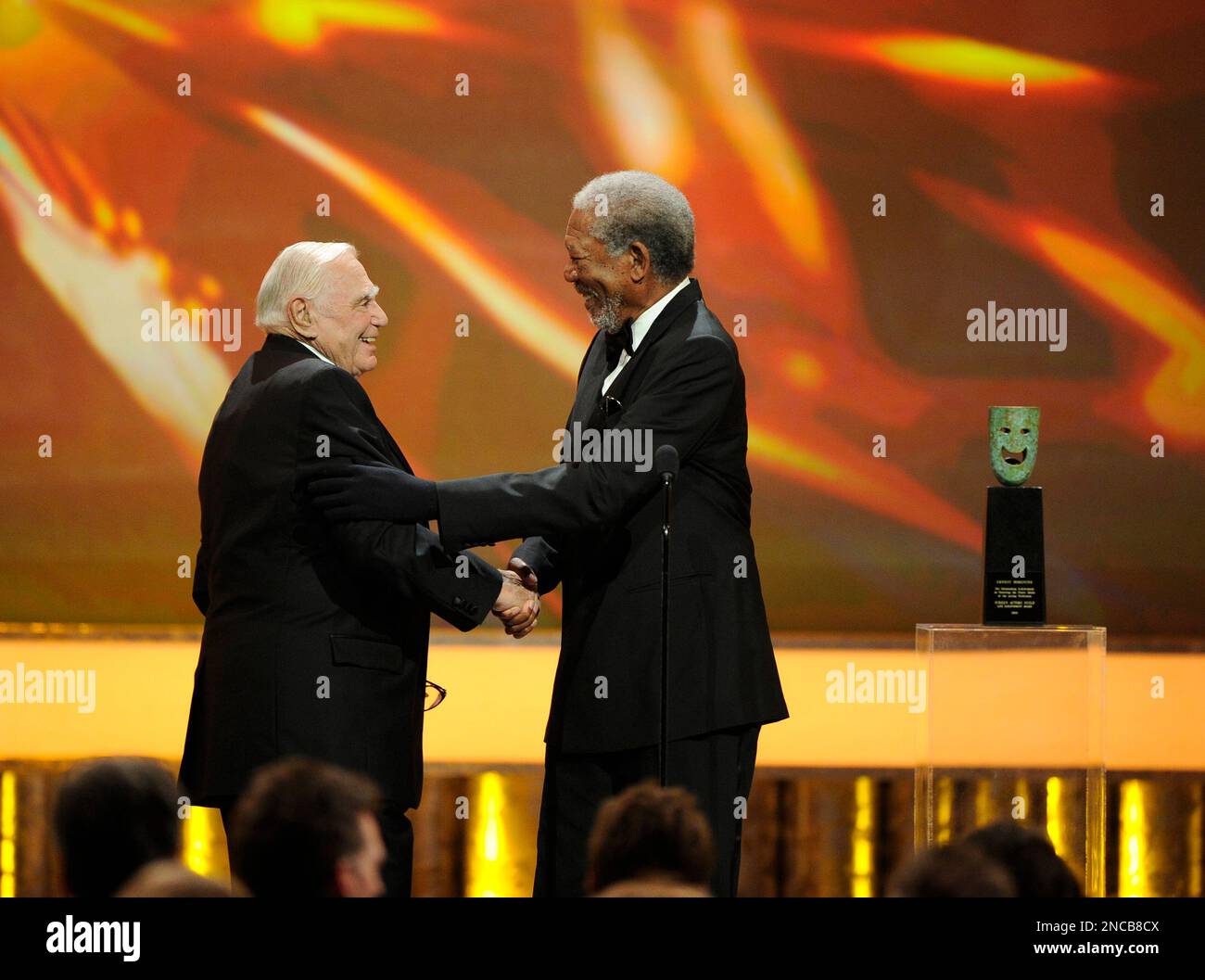 Morgan Freeman, right, presents Ernest Borgnine with the Life ...