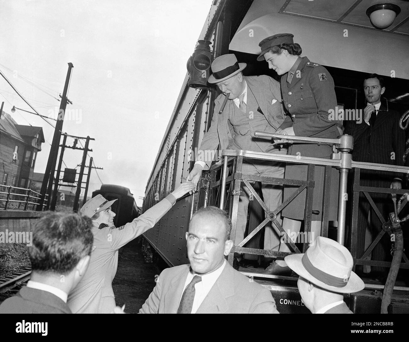 Prime Minister Winston Churchill, standing with his daughter, subaltern ...