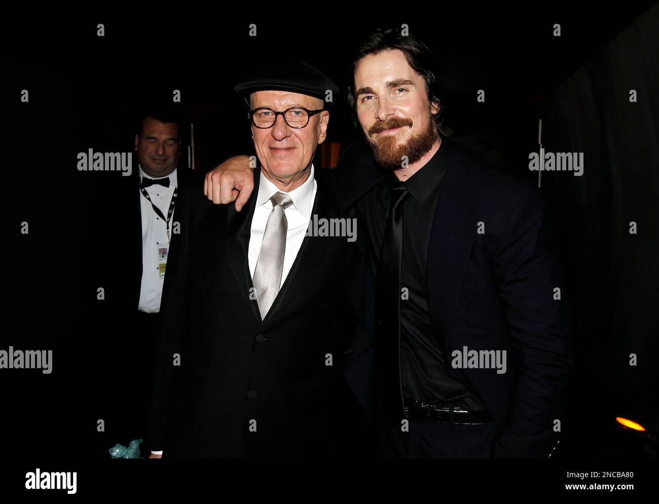 Geoffrey Rush, left, and Christian Bale are seen backstage at the 17th ...
