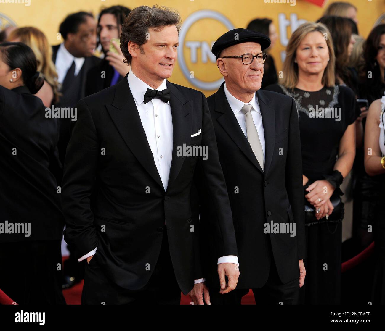 Colin Firth, left, and Geoffrey Rush arrive at the 17th Annual Screen ...