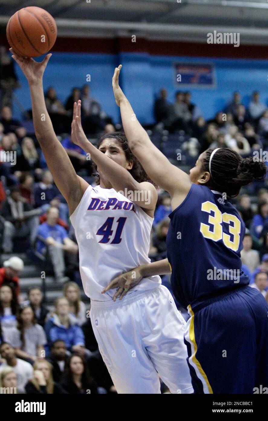 DePaul's Felicia Chester, left, shoots over West Virginia's Ayana ...