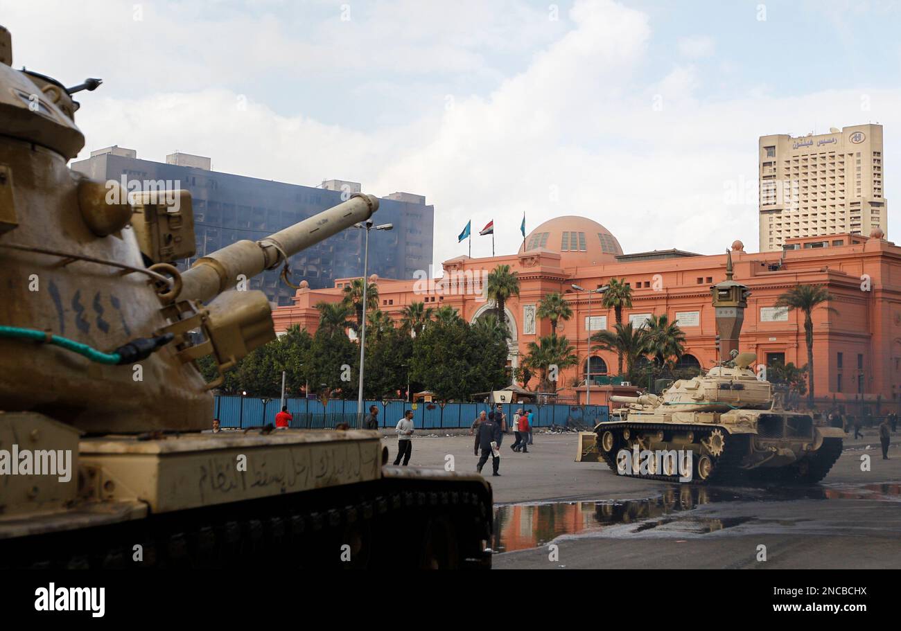 Egyptian armored vehicles take up positions outside the Egyptian museum ...