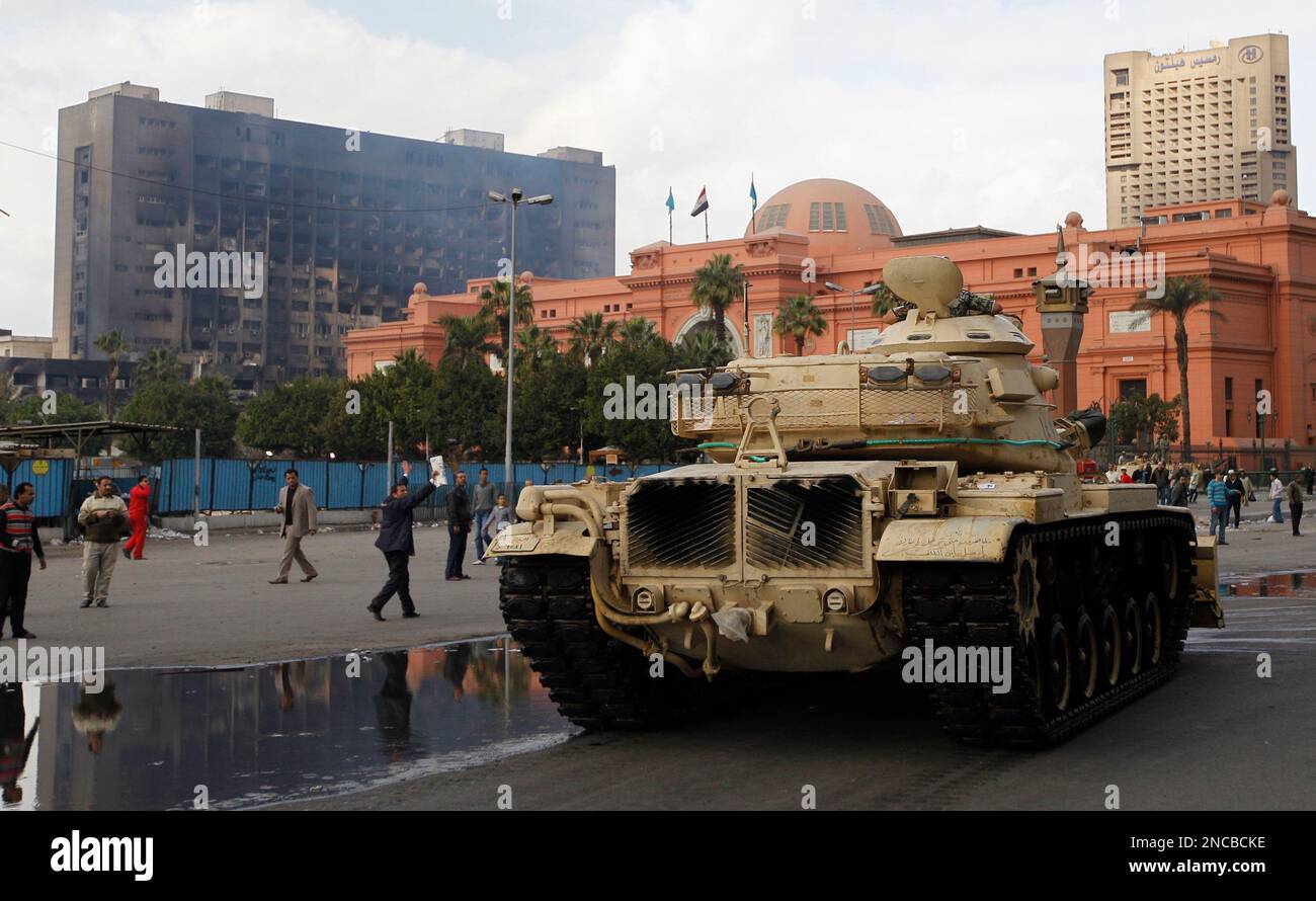 Egyptian armored vehicles take position outside the Egyptian museum in ...