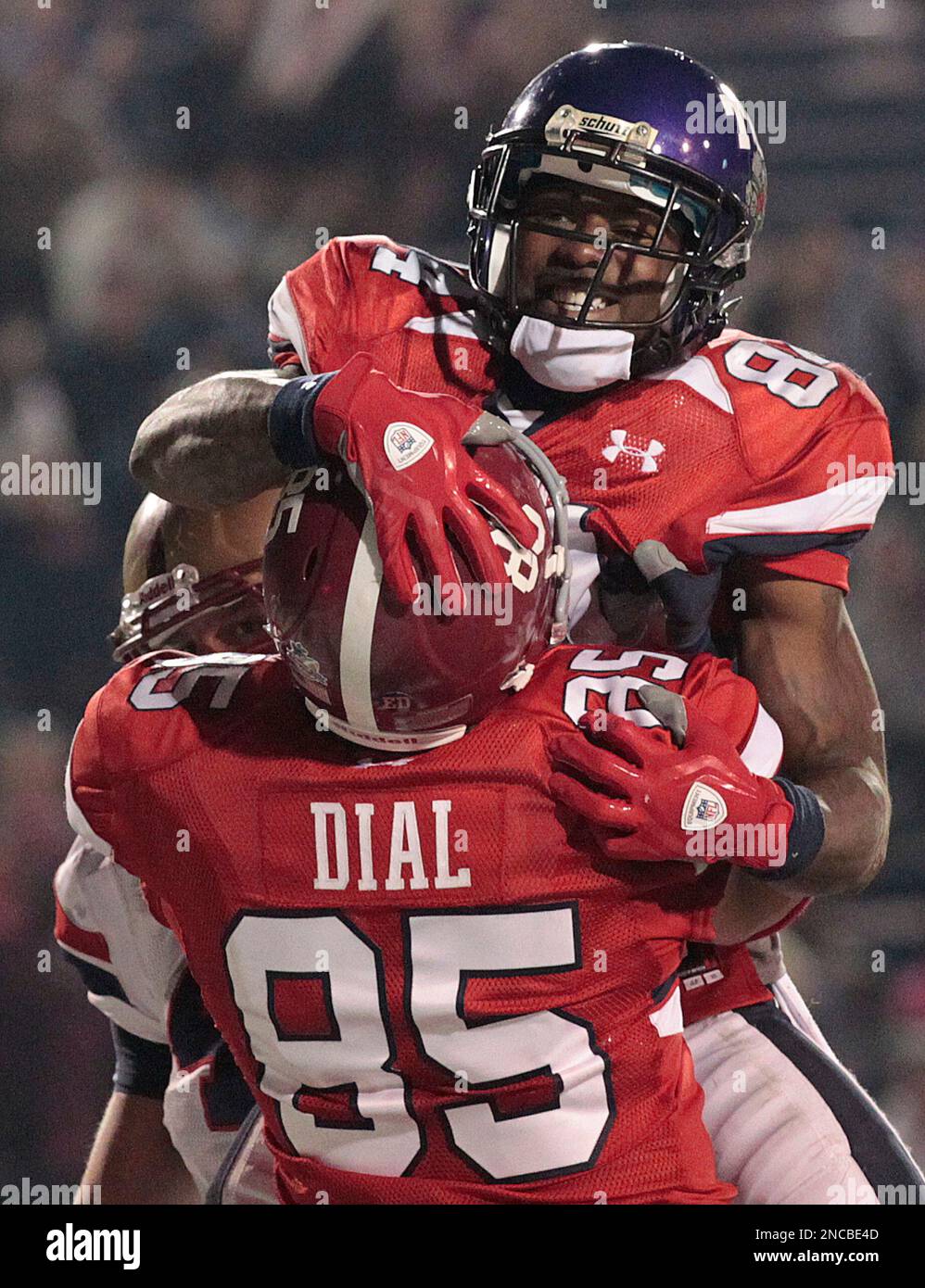South squad receiver Jeremy Kerley (84) of TCU reacts with teammate ...