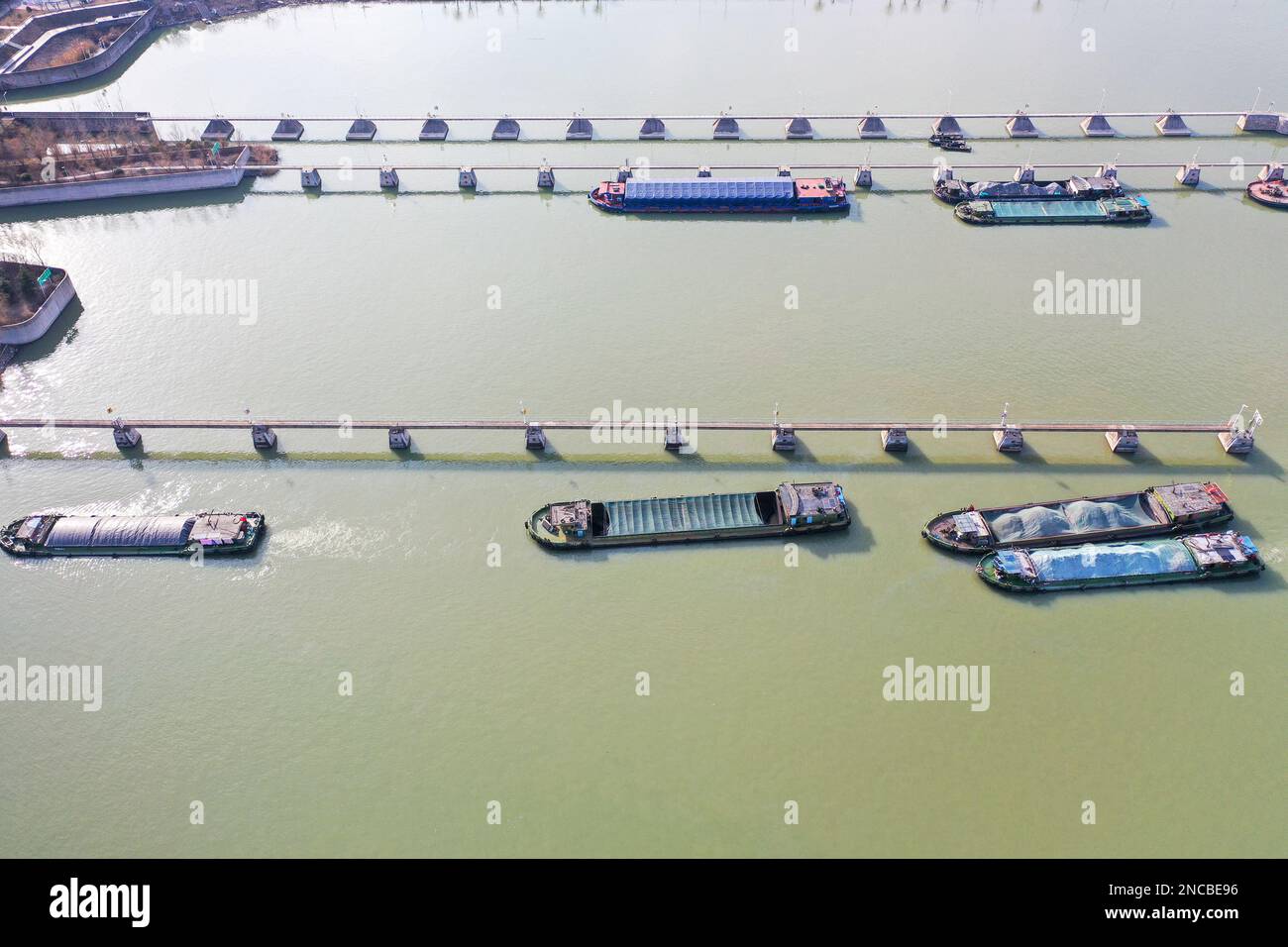 SUQIAN, CHINA - FEBRUARY 14, 2023 - Coal cargo ships pass through the ...