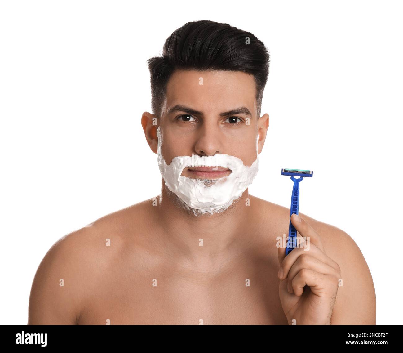 Handsome man shaving with razor on white background Stock Photo - Alamy